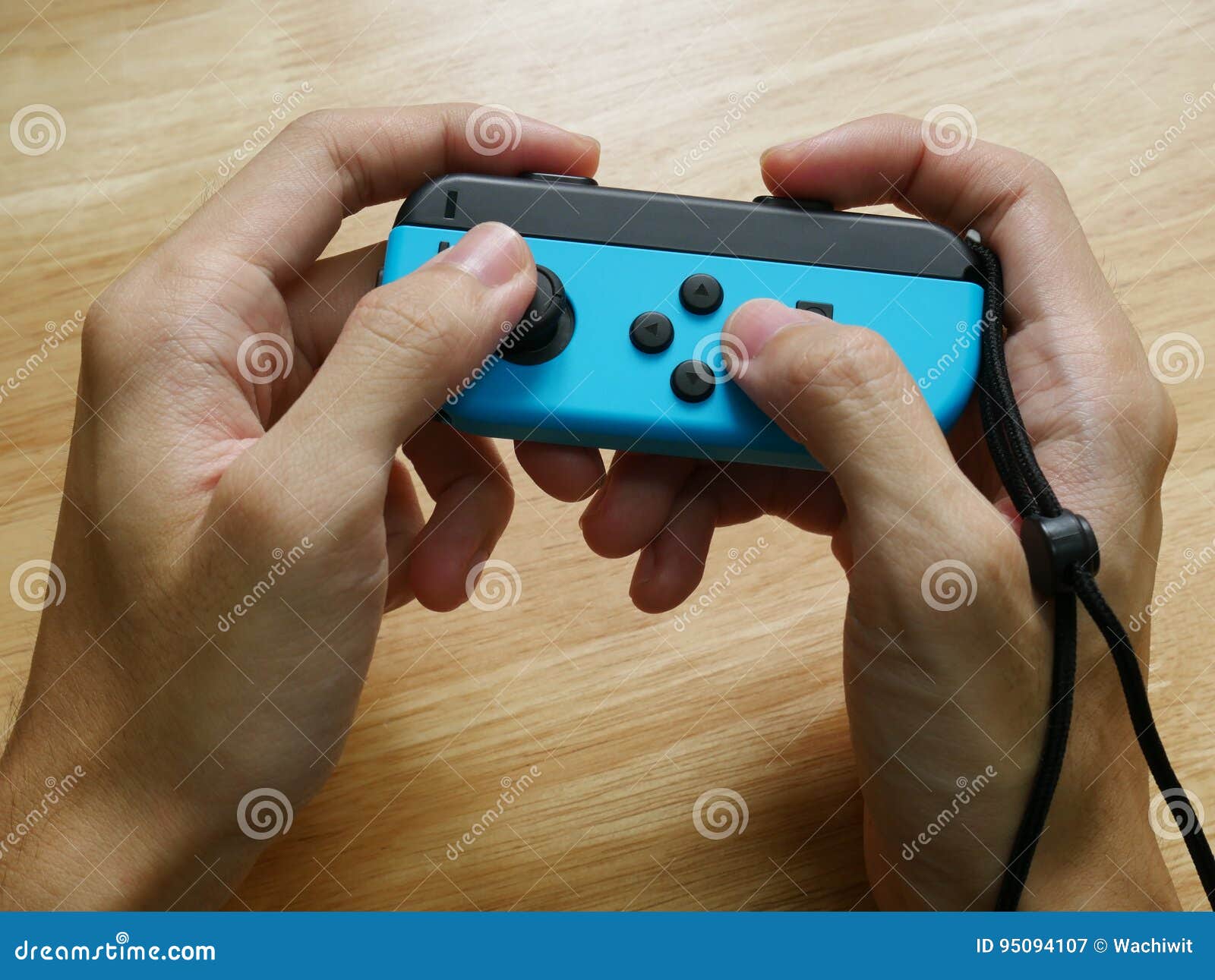Nintendo Switch Controller Held in Hand. Editorial Photography - Image ...