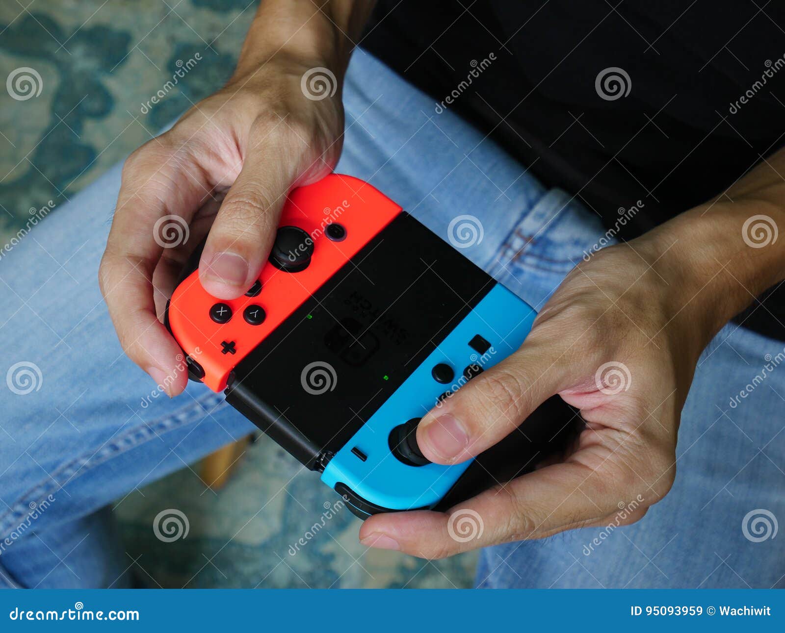 Nintendo Switch Controller Held in Hands. Editorial Stock Image - Image ...