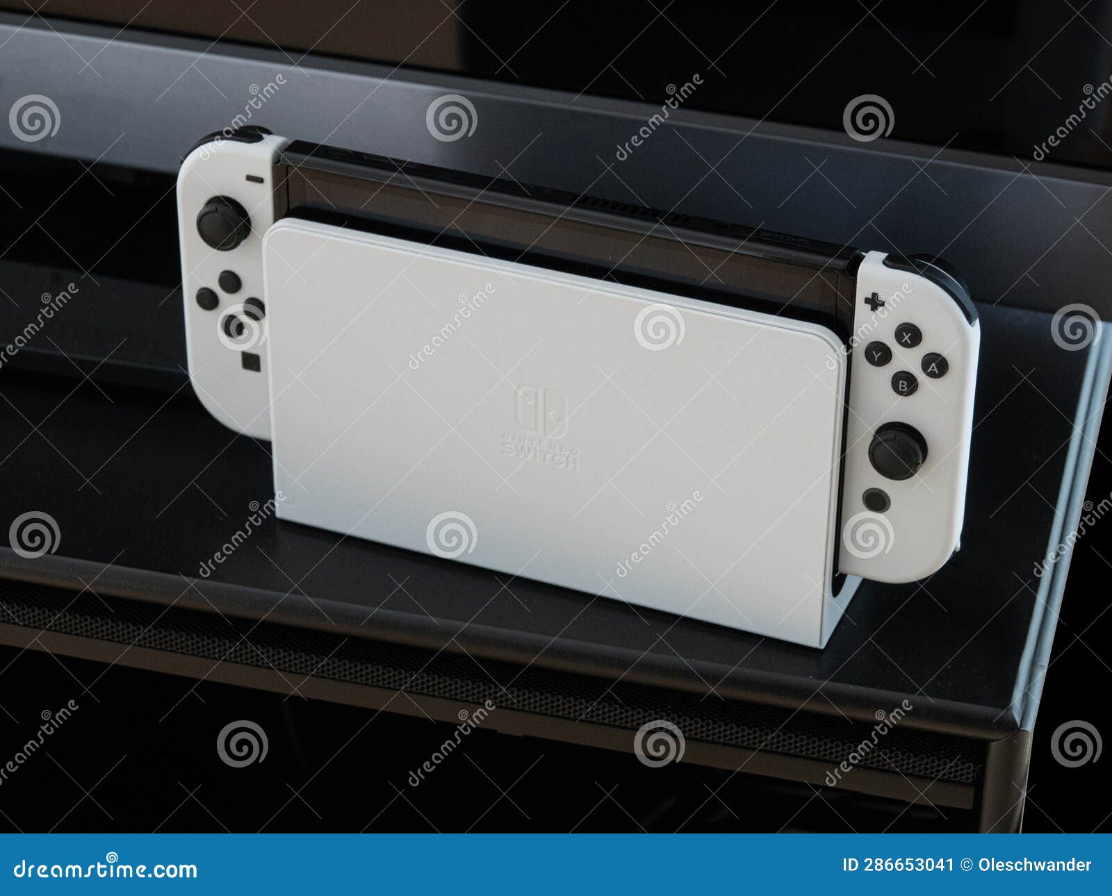 Nintendo Switch OLED Model in Handheld Mode. Popular Mobile Gaming ...