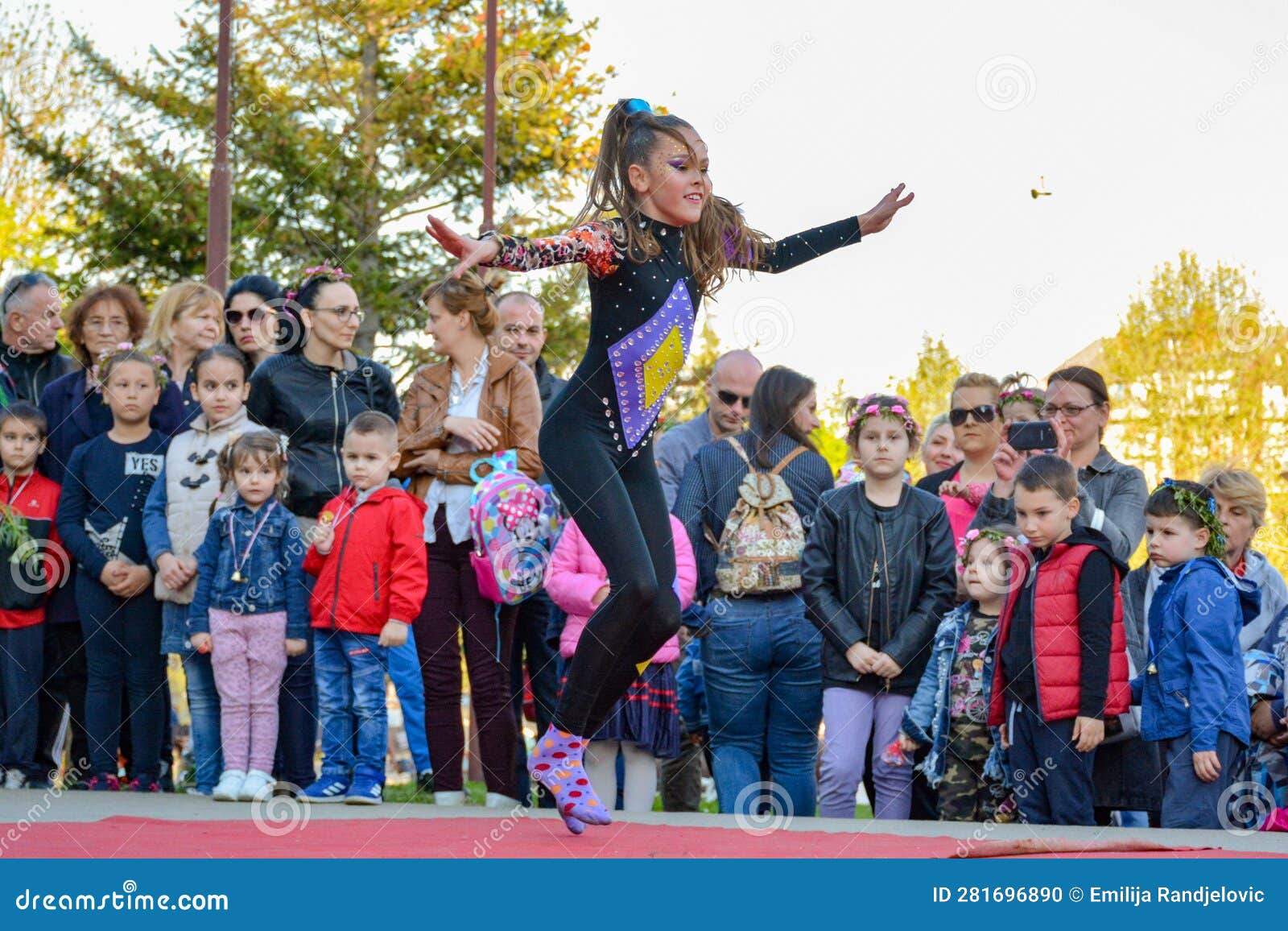 Energetic Dance and Leaping Performance by a Young Girl in Exotic Black ...