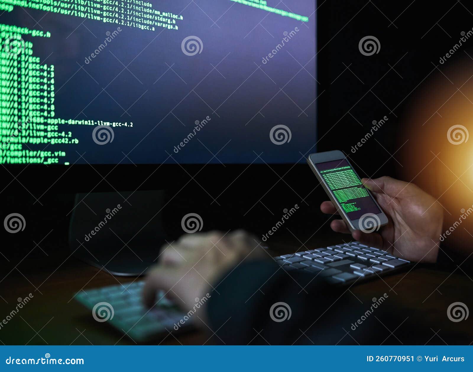 No Code is Uncrackable. an Unidentifiable Computer Hacker Using a Smartphone To Hack into a ...