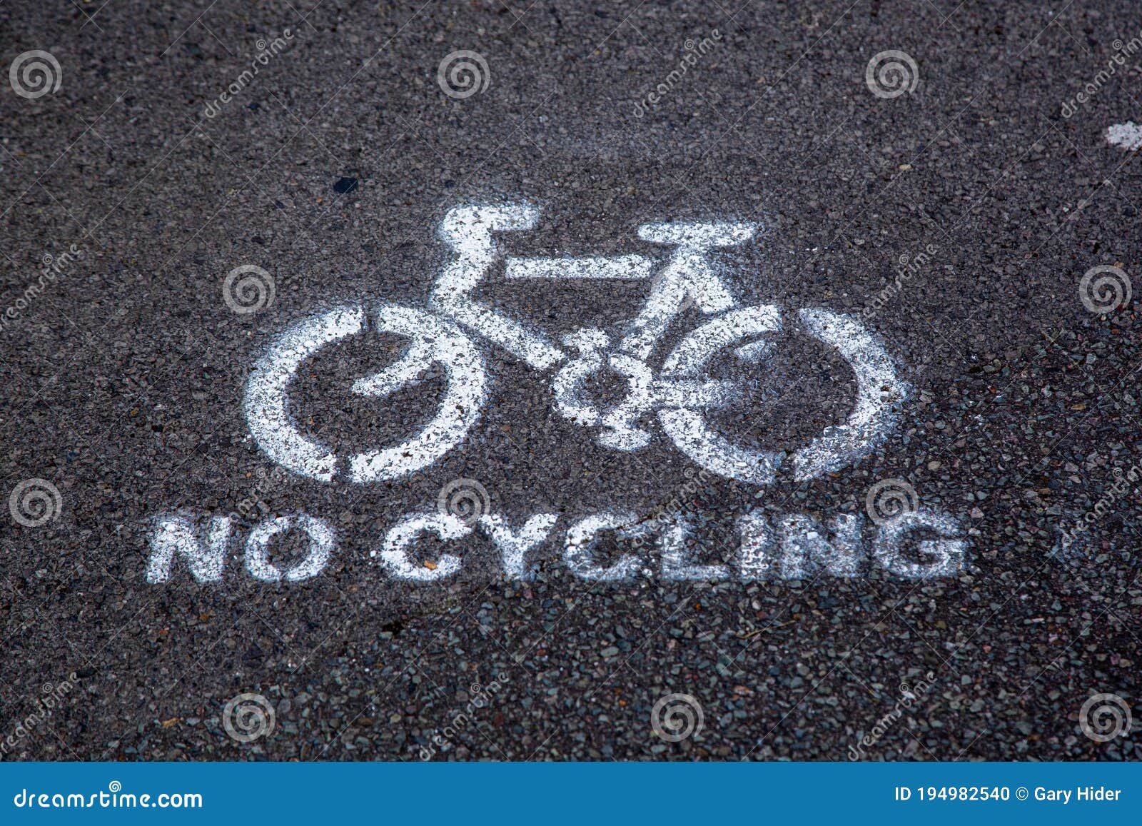 A No Cycling Sign Spray Painted on a Walkway or Sidewalk Stock Photo ...