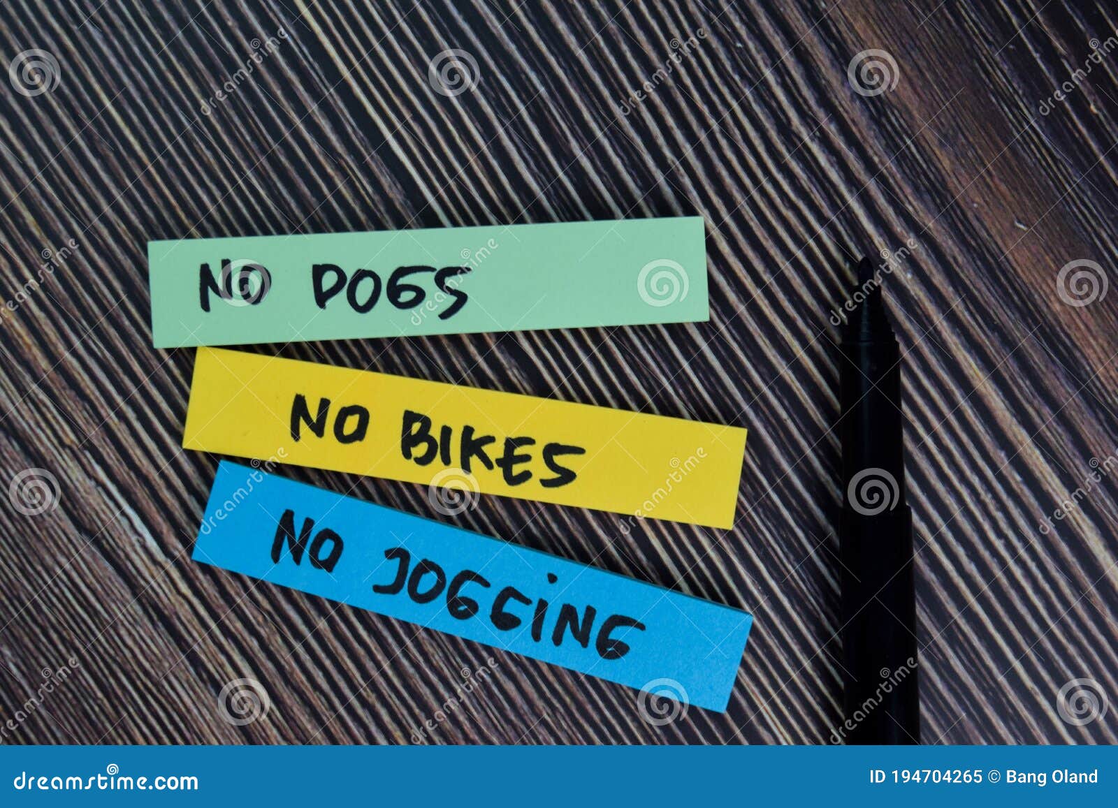 No Dogs, No Bikes, No Jogging Write on Sticky Notes Isolated on Office ...