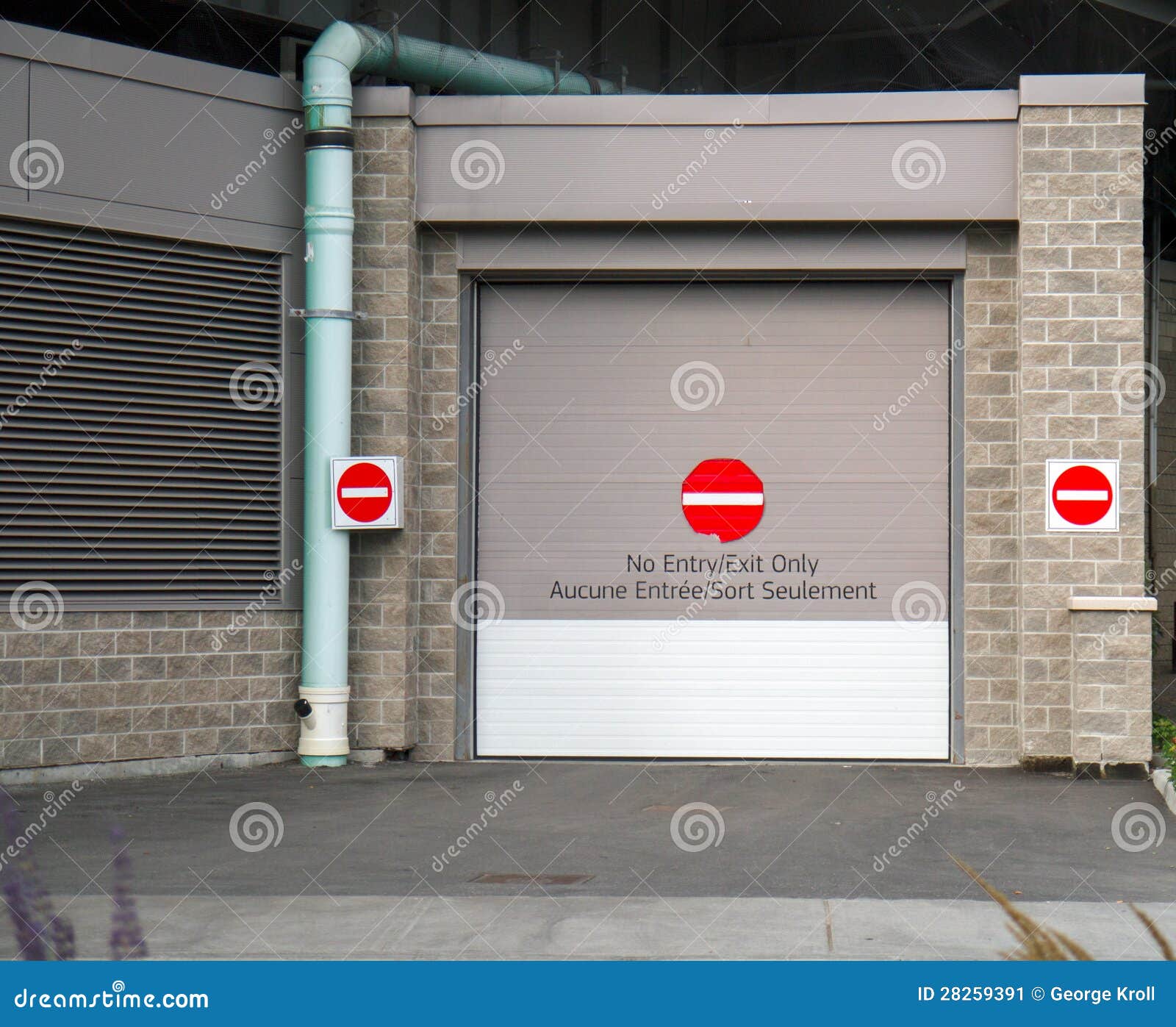 Entry / Exit Sign Against Rope Barrier Stanchion Queue Rope Barrier ...
