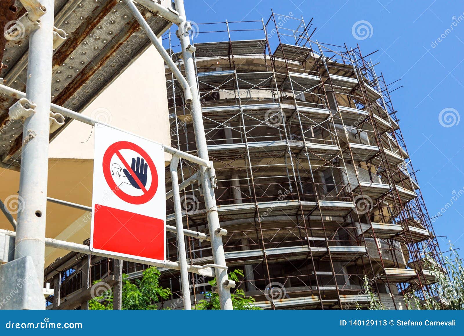 No Entry Sign on the Fence in Contruction Site with House Under ...