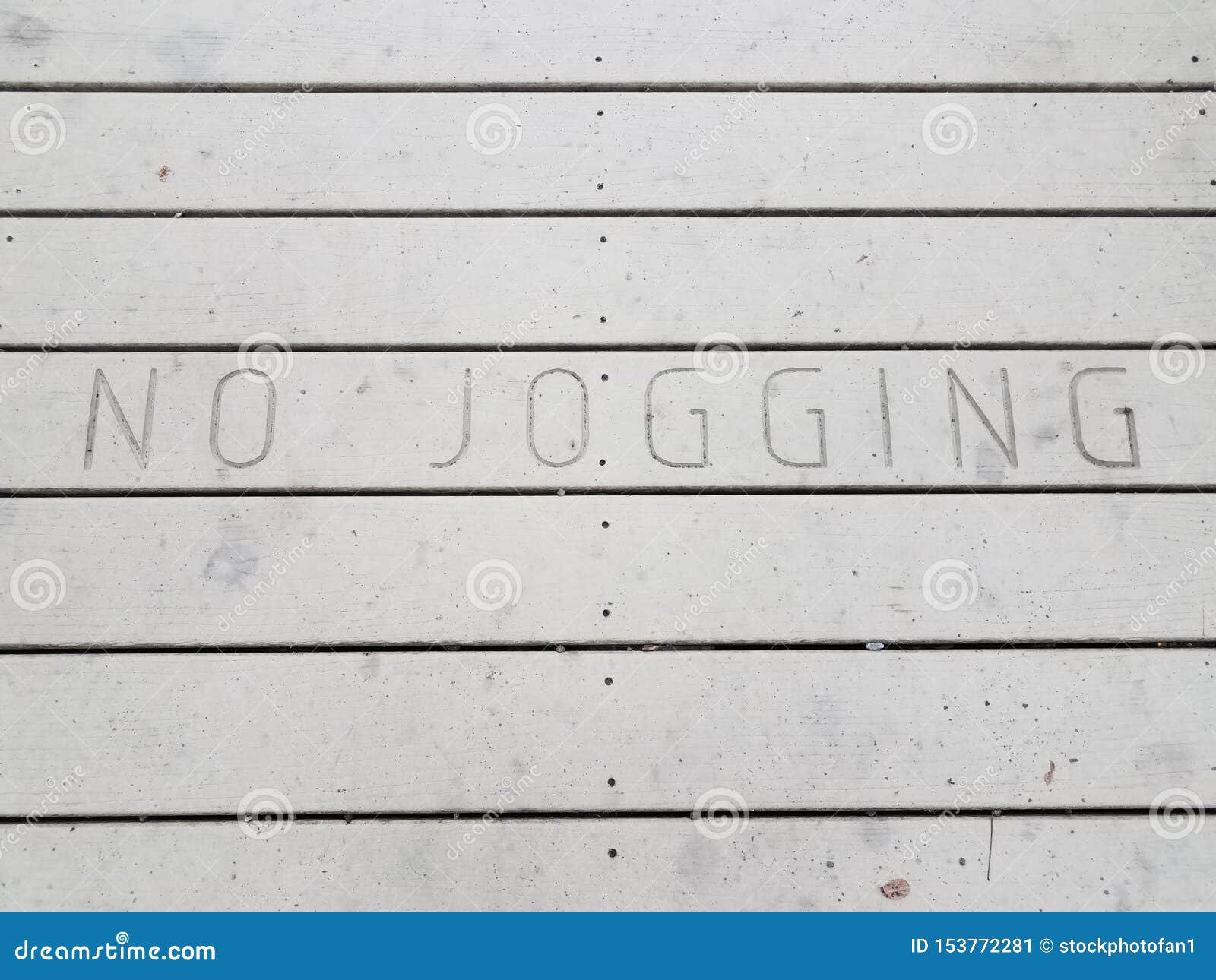 No Jogging Sign on Brown Wood Boardwalk or Ground Stock Image - Image ...