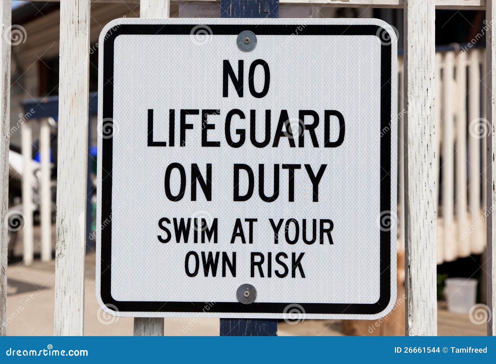 No Lifeguard on Duty Sign stock photo. Image of risk - 26661544