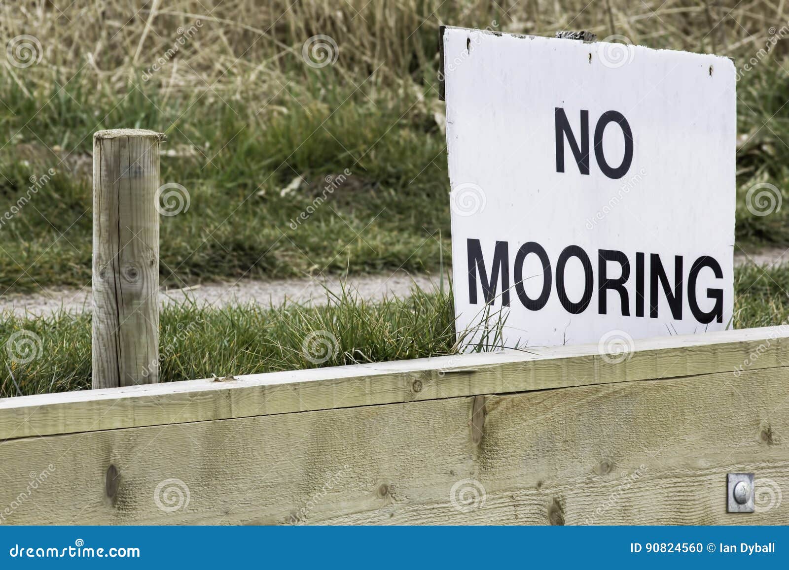 A Red No Mooring Sign Beside A Floating Dock During A Storm Royalty ...