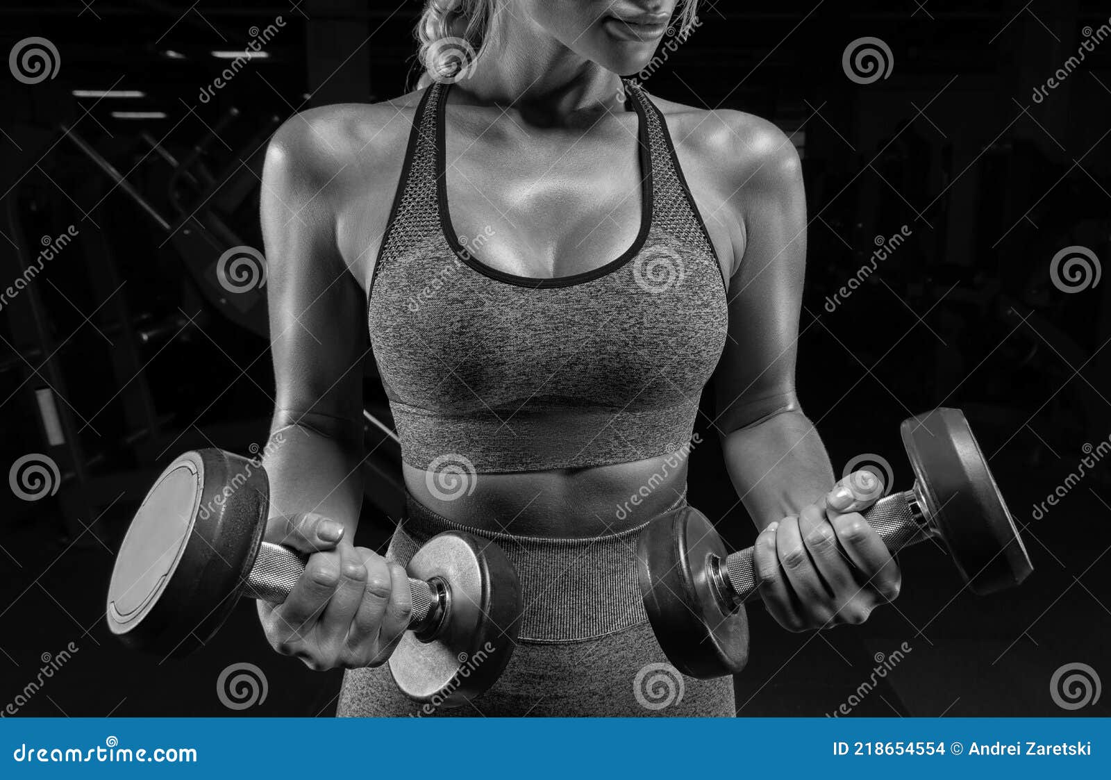 No Name Portrait Of A Girl In A Tracksuit Posing In The Gym With