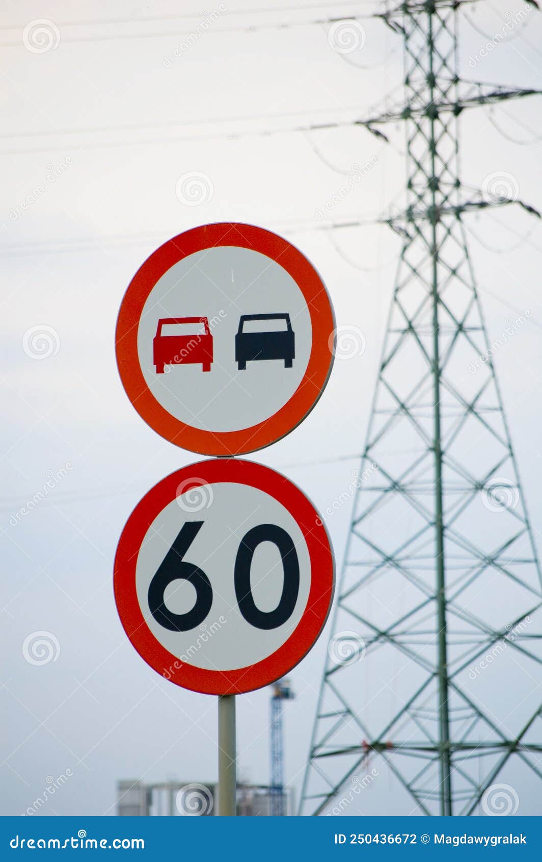 No Overtaking and Speed Limit Signs Against Industrial Sky. Stock Photo ...