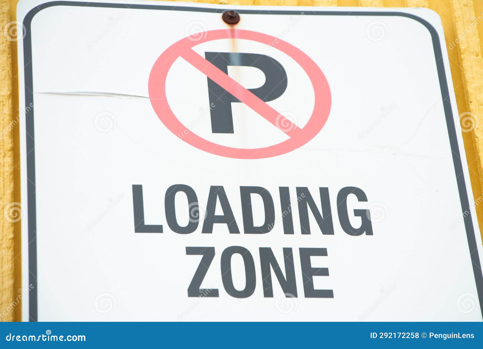 No Parking Loading Zone Sign on Yellow Wall, Close Up 99 P 20 Stock ...