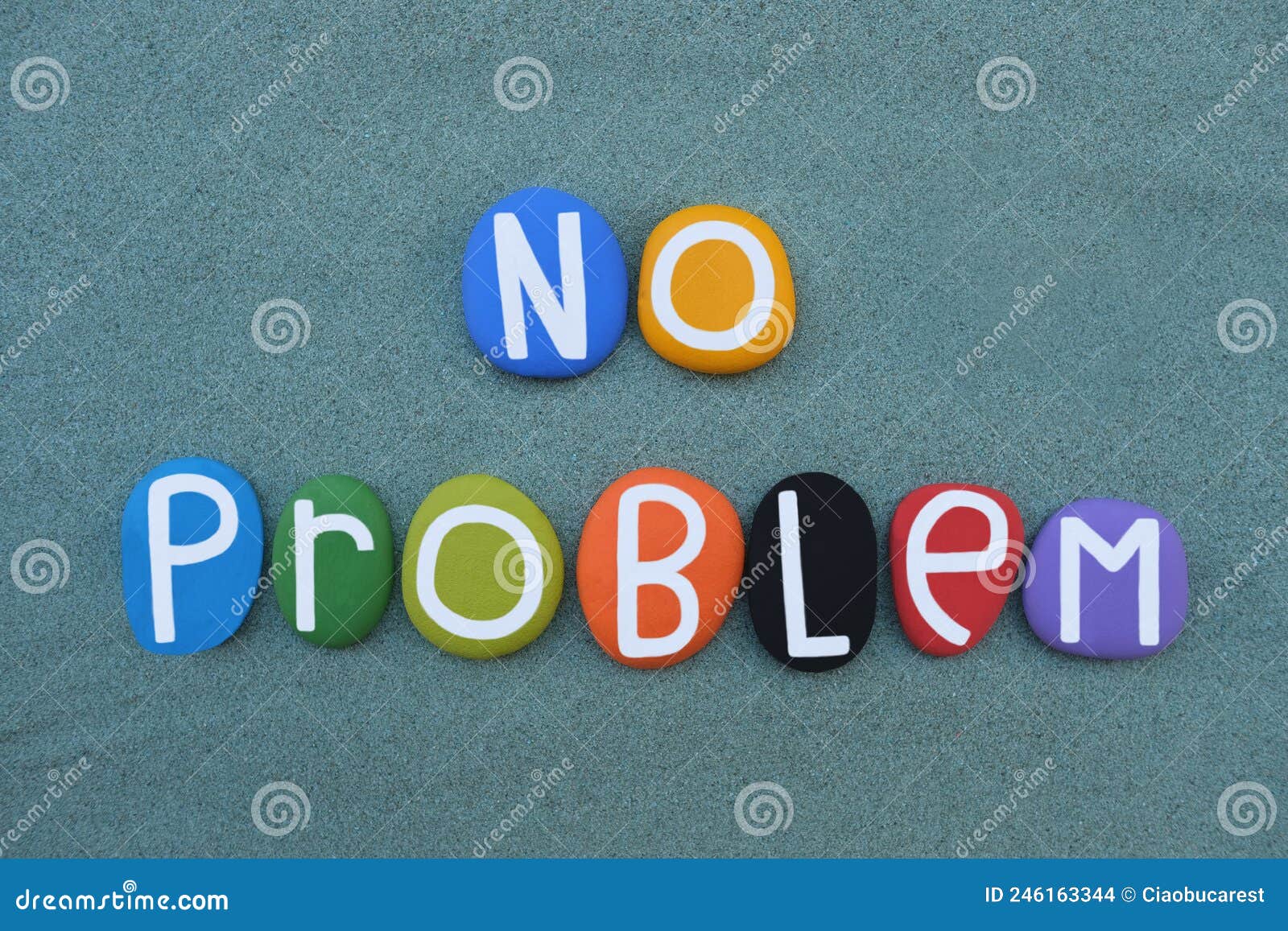 No Problem Text Composed with Multi Colored Stone Letters Over Green ...