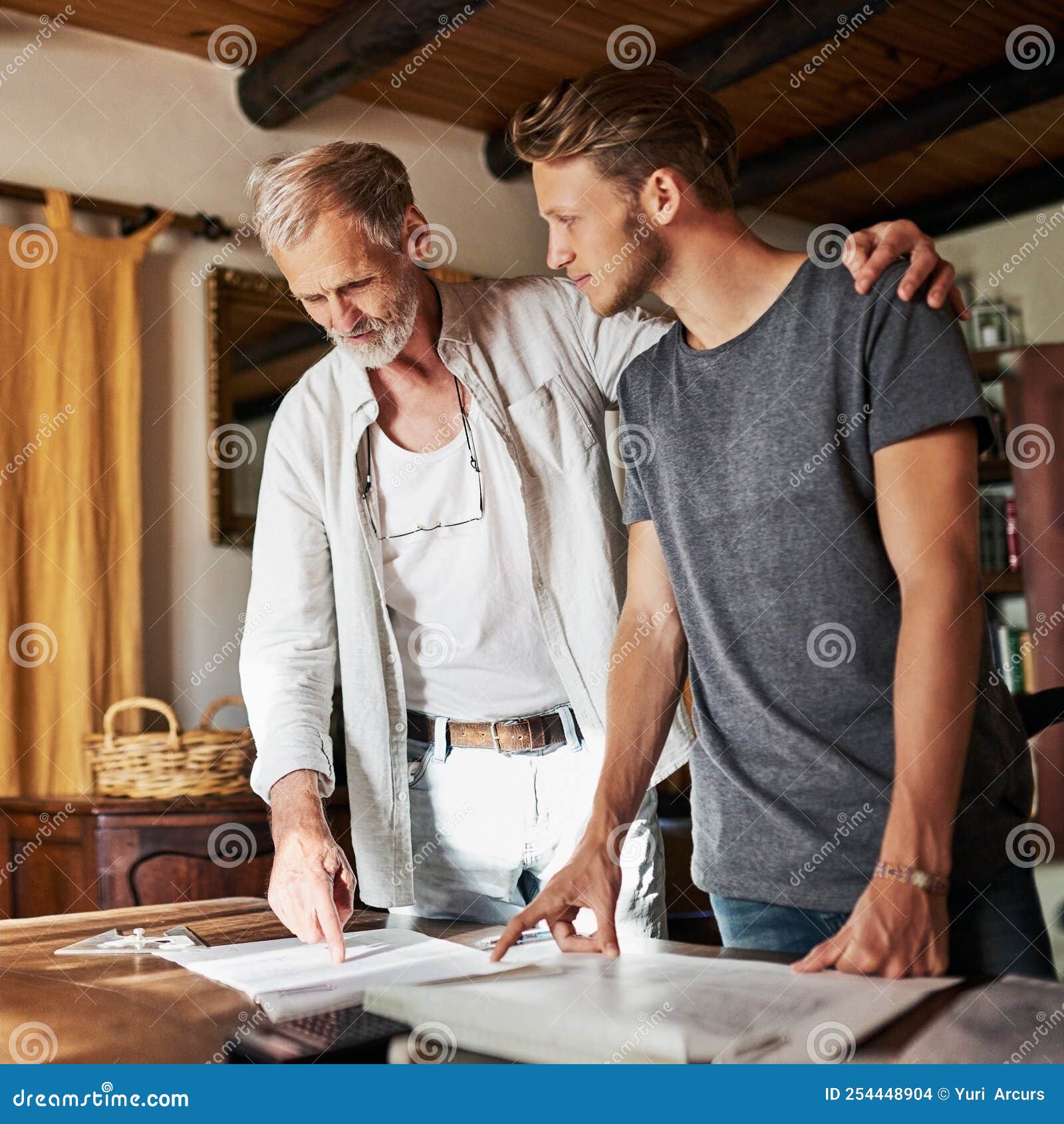 No Problem is Too Big, Son. Two Men Working on a Project Together at ...