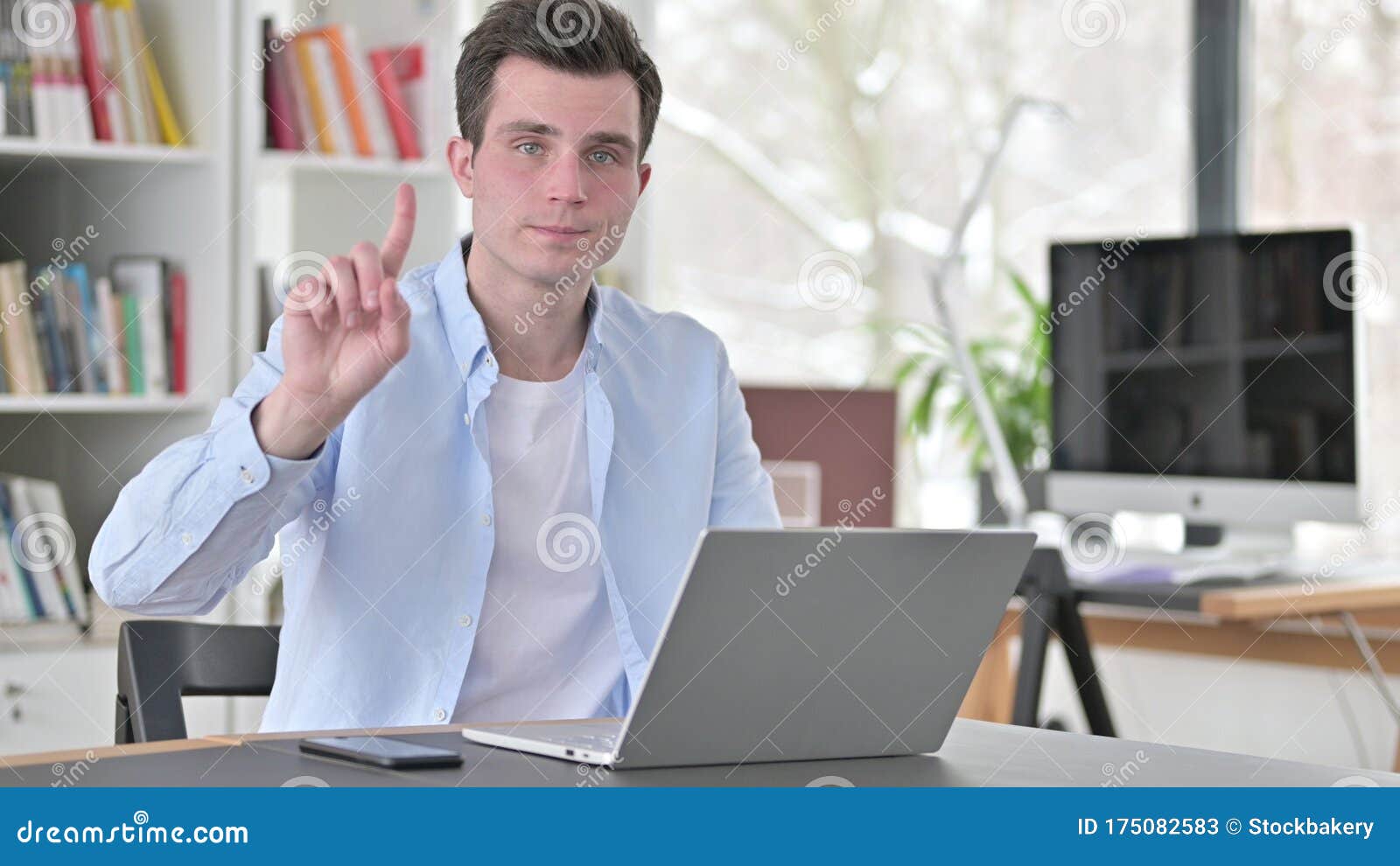 No, Rejecting Young Man Waving Finger at Work Stock Image - Image of ...