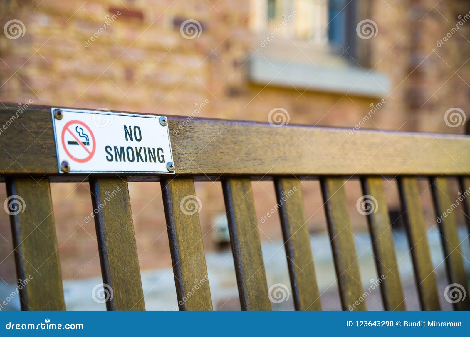 Bench With A Designated Smoking Area Sign Above Stock Image ...