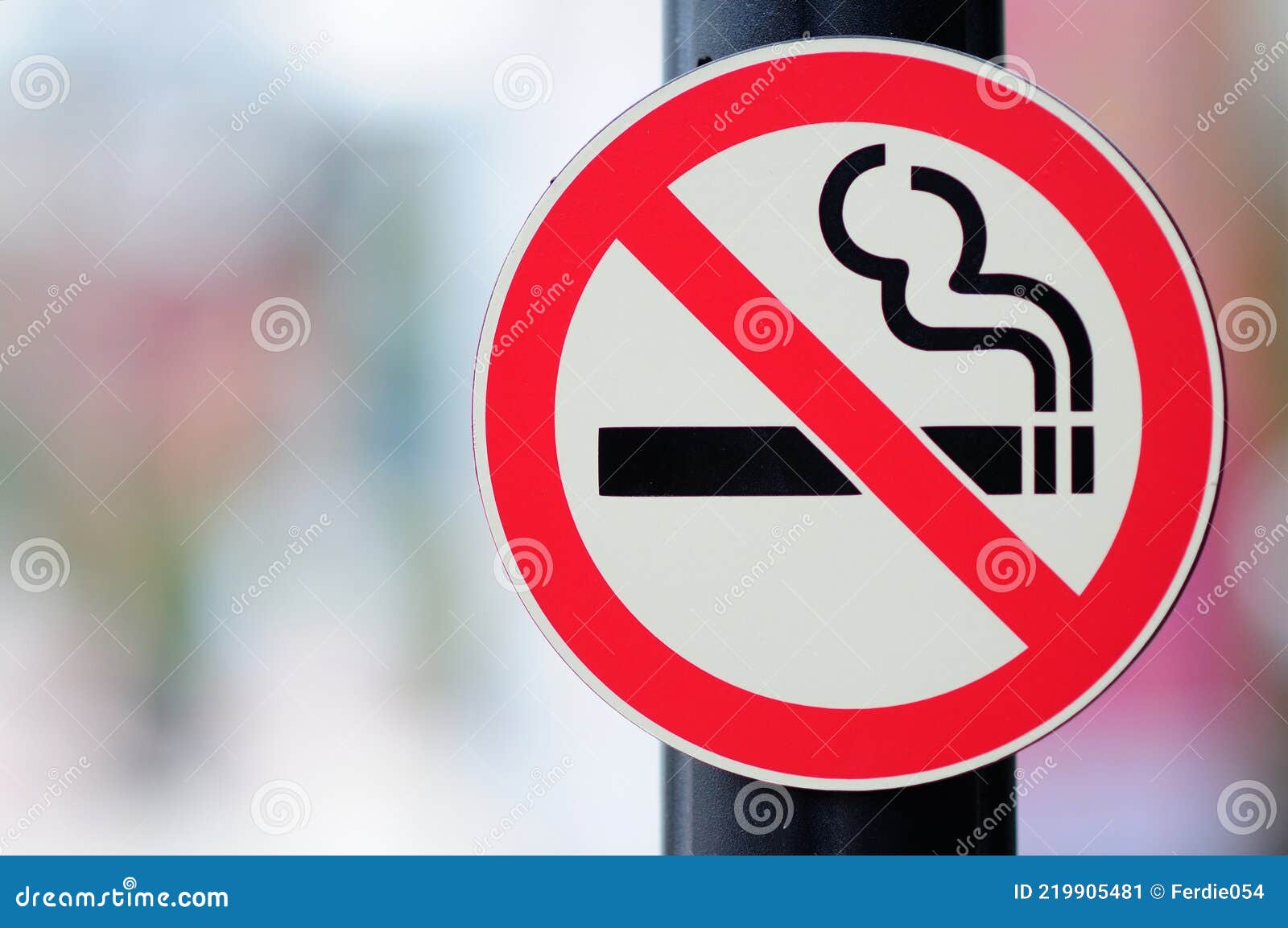 No Smoking Sign on a Post stock image. Image of cigarette - 219905481
