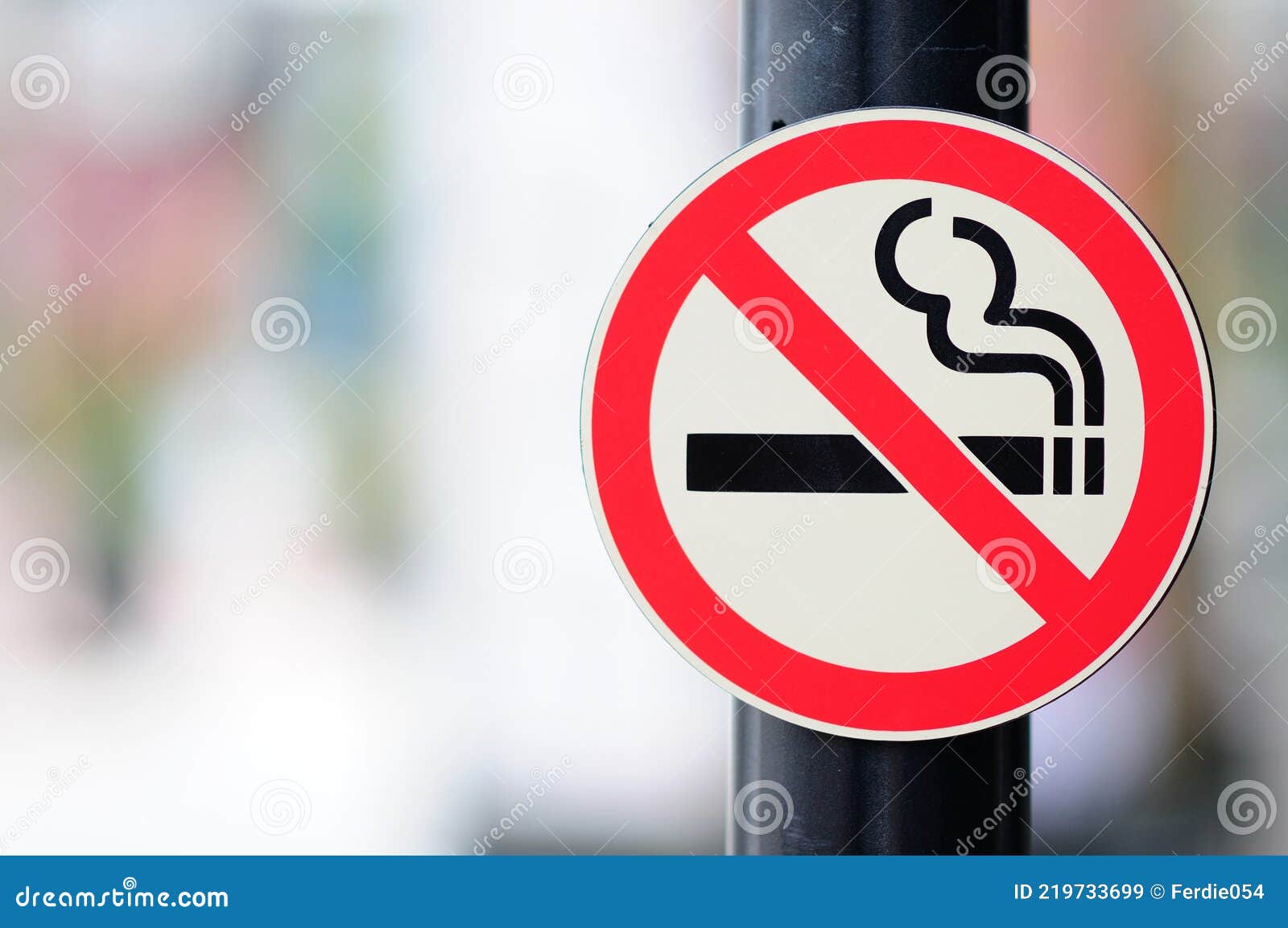 No Smoking Sign on a Post stock image. Image of message - 219733699
