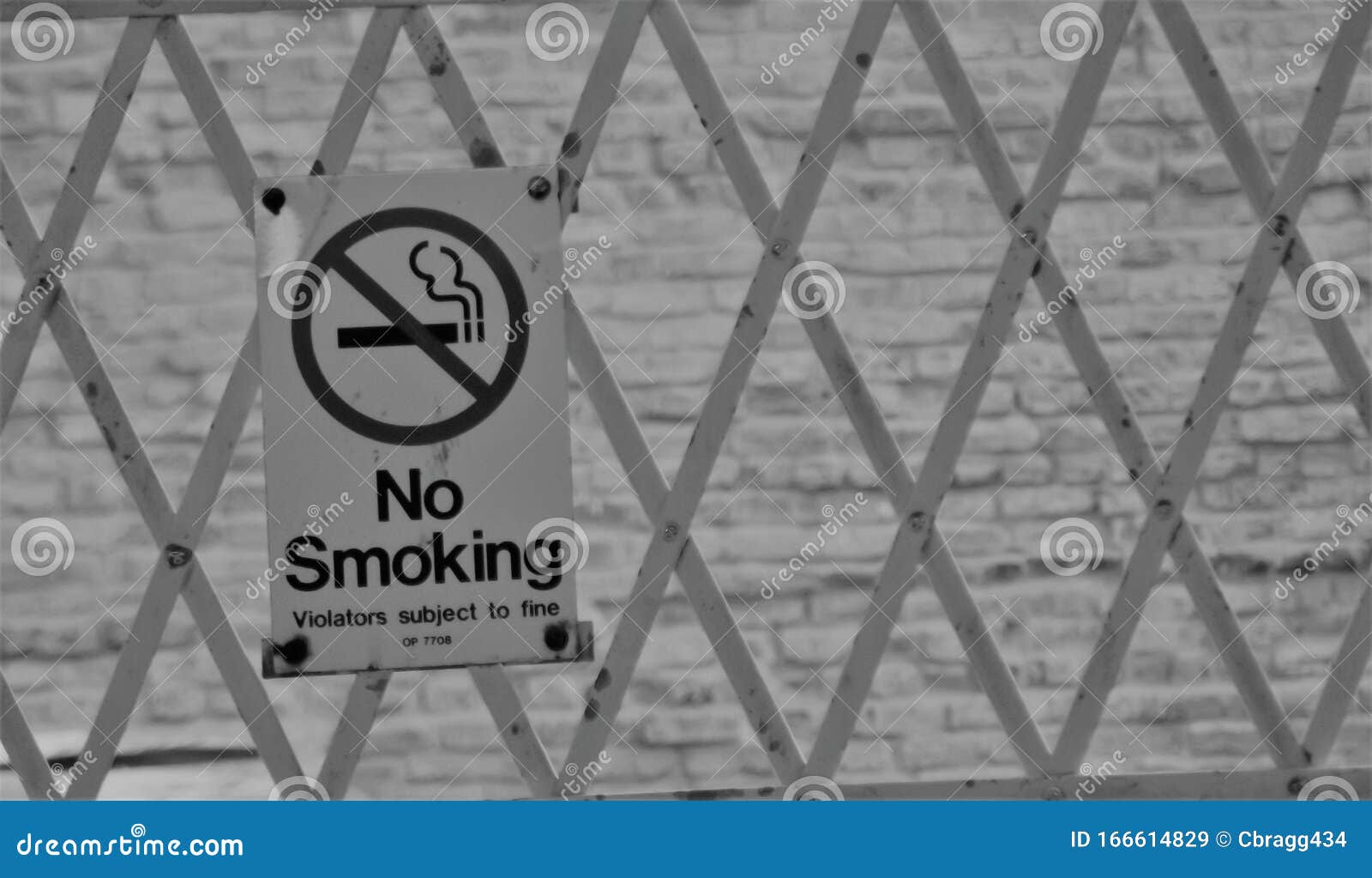 No Smoking Sign Posted on Front of Fence Stock Image - Image of posted ...