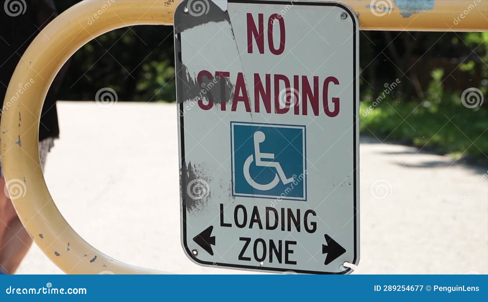 No Standing Loading Zone with Handicap Symbol and Two Arrows Pointing ...