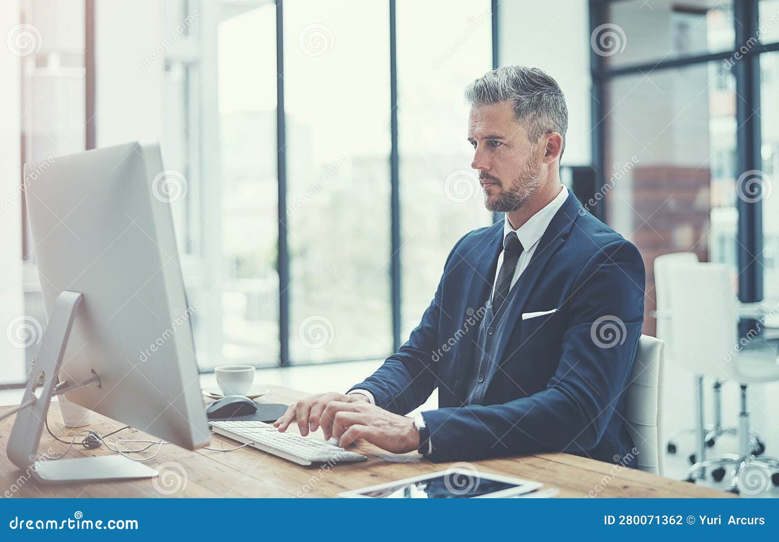 No Task he Cant Complete without Technology. a Mature Businessman Using ...