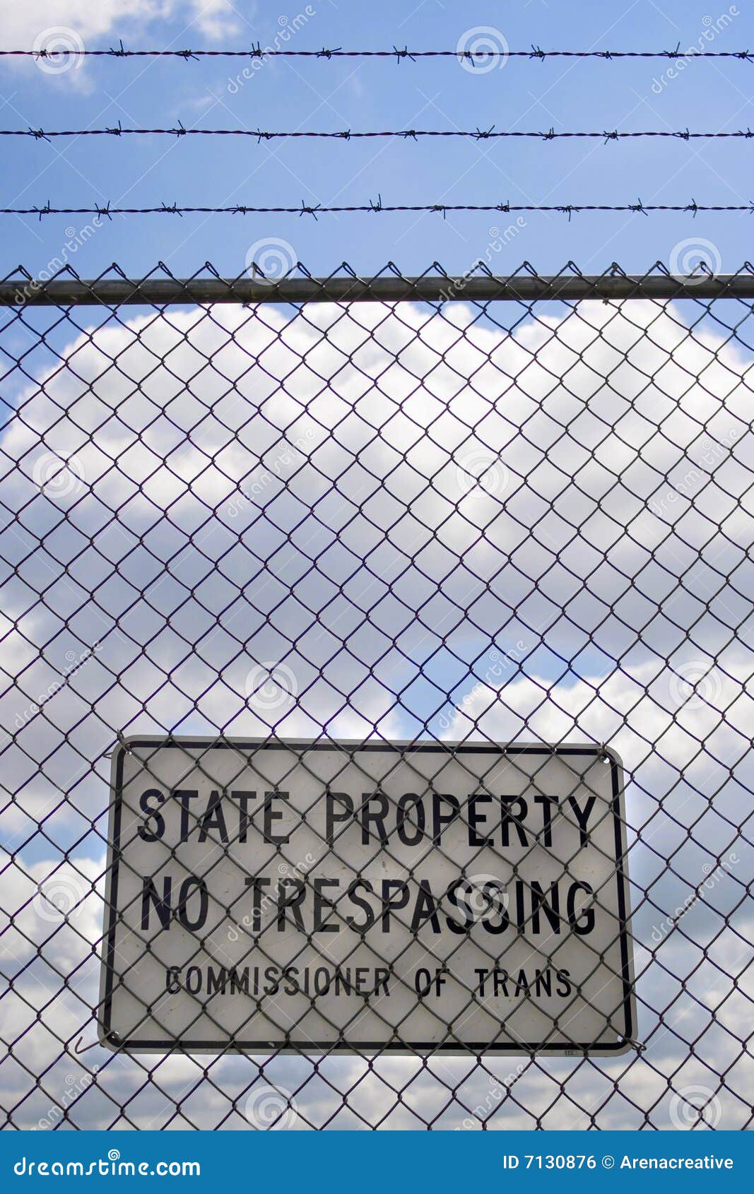 No Trespassing Sign On A Train Station With Rail Roads In The Blurred ...