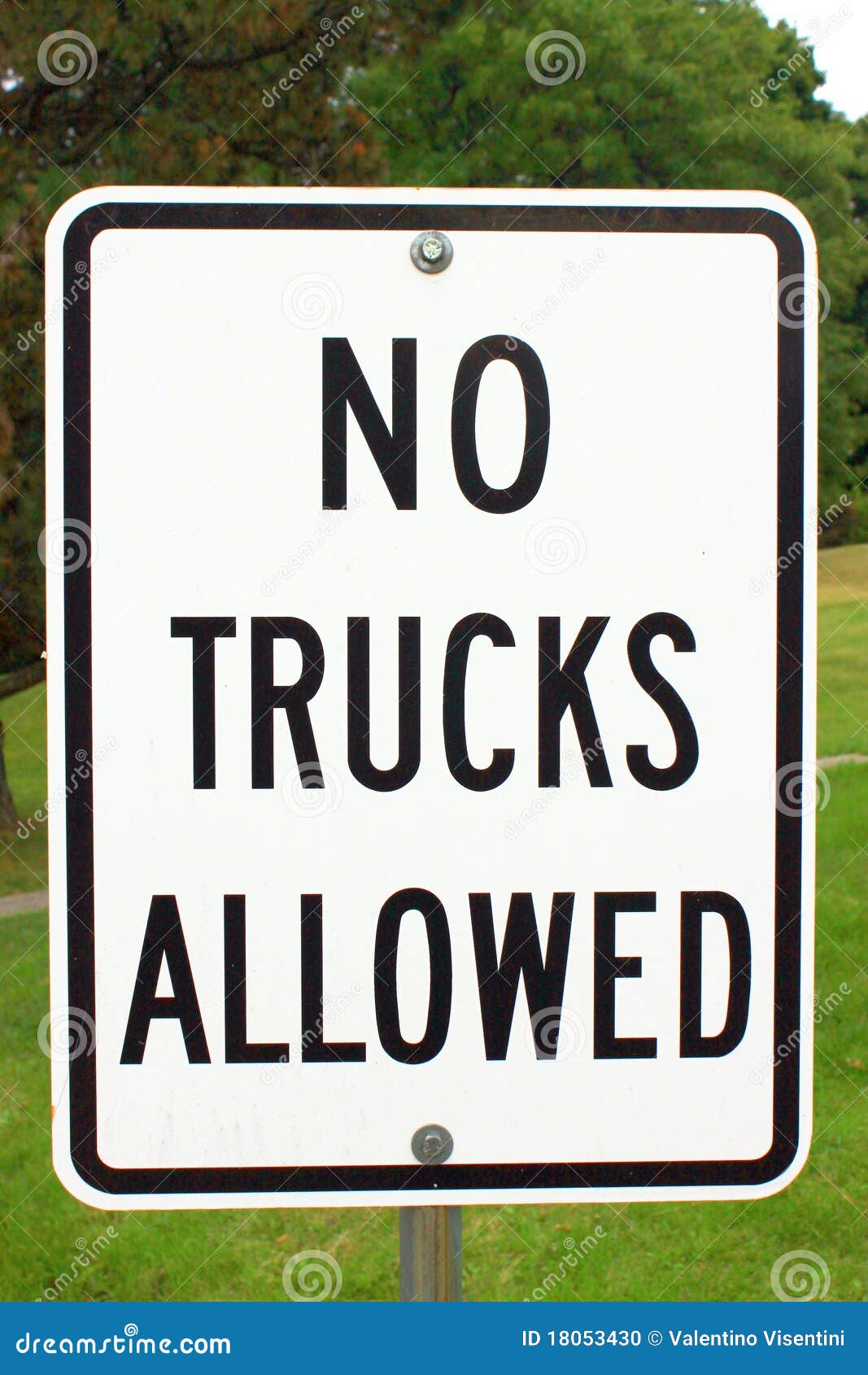 No Trucks Allowed Street Sign In A Red Circle And Pedestrian Crossing ...