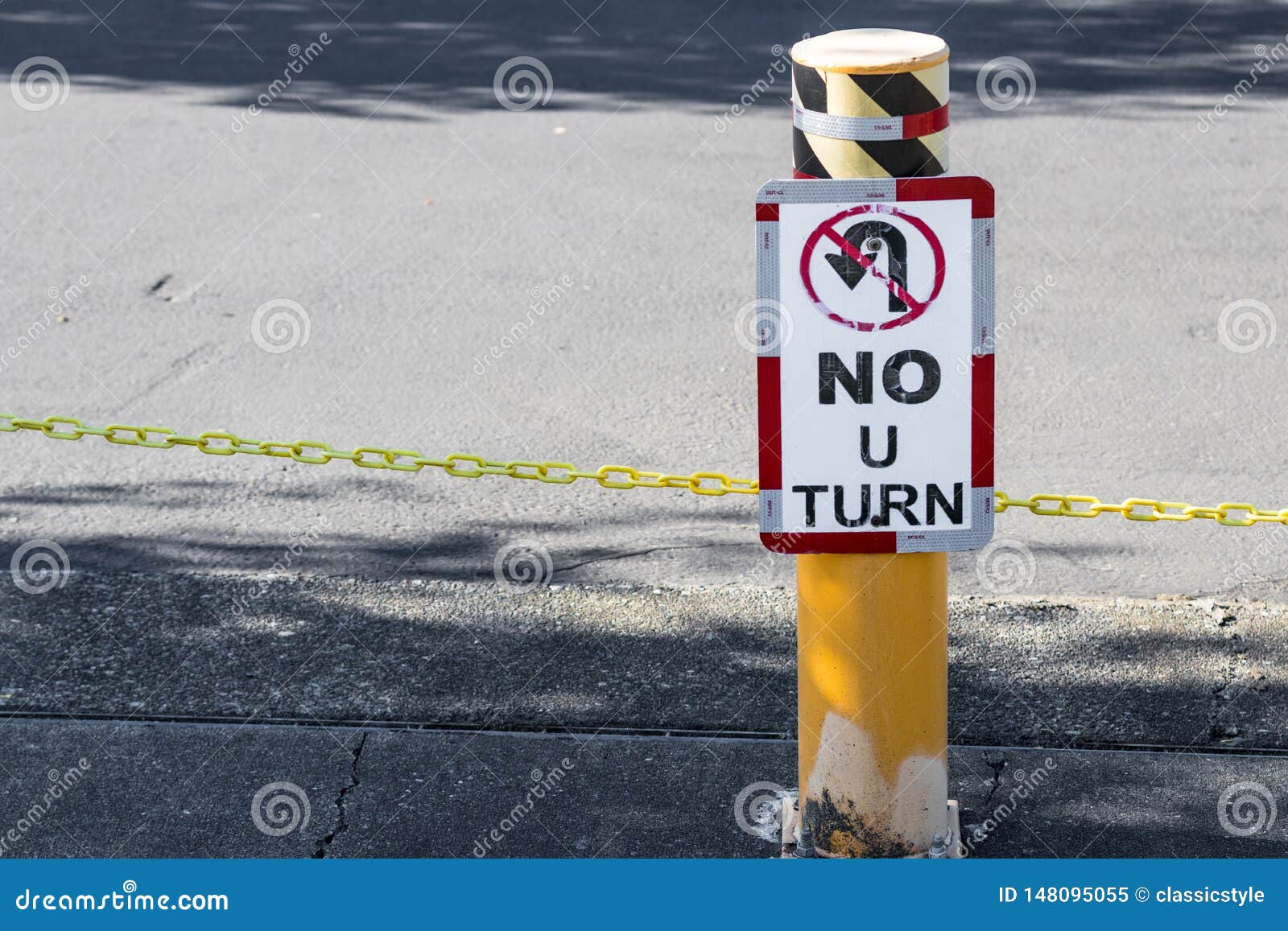 No U-Turn sign on a post stock image. Image of street - 148095055