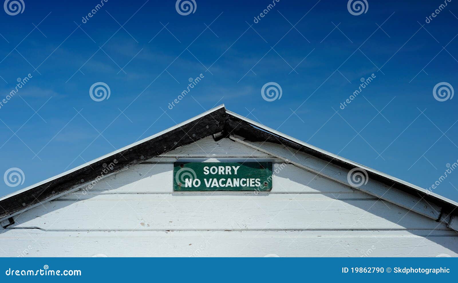No Vacancies Sign Set Against Deep Blue Sky Stock Photo - Image of ...