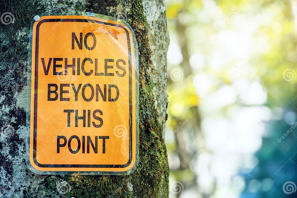 No Vehicles Beyond this Point Sign Stock Photo - Image of green, forest ...