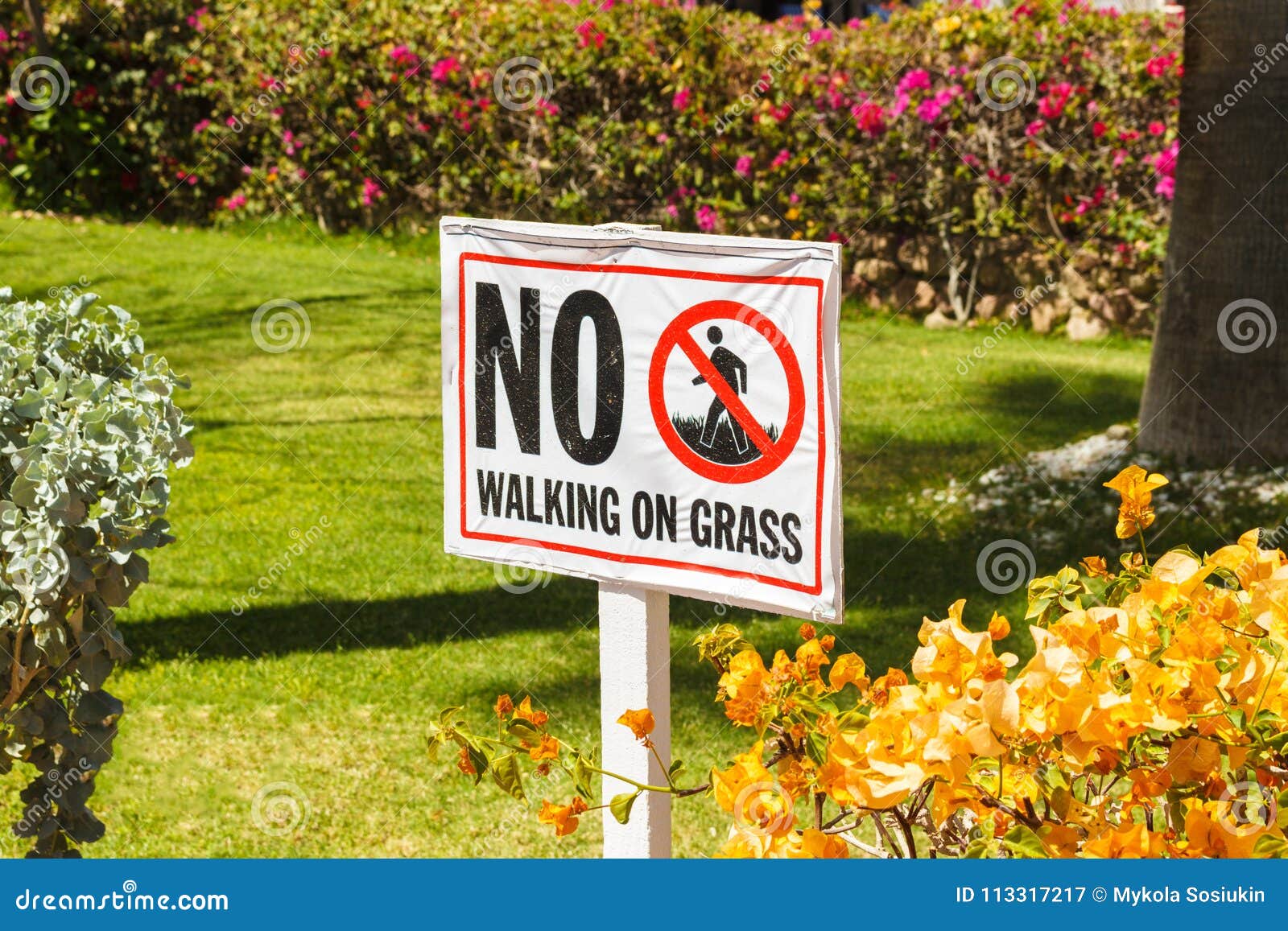 No Walking on Grass Warning Sign in the Garden Stock Image - Image of ...