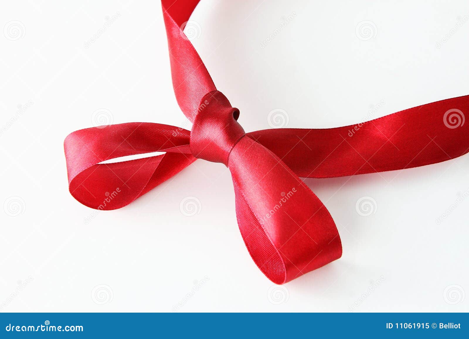 Noeud rouge de bande image stock. Image du brillant, décoration - 11061915