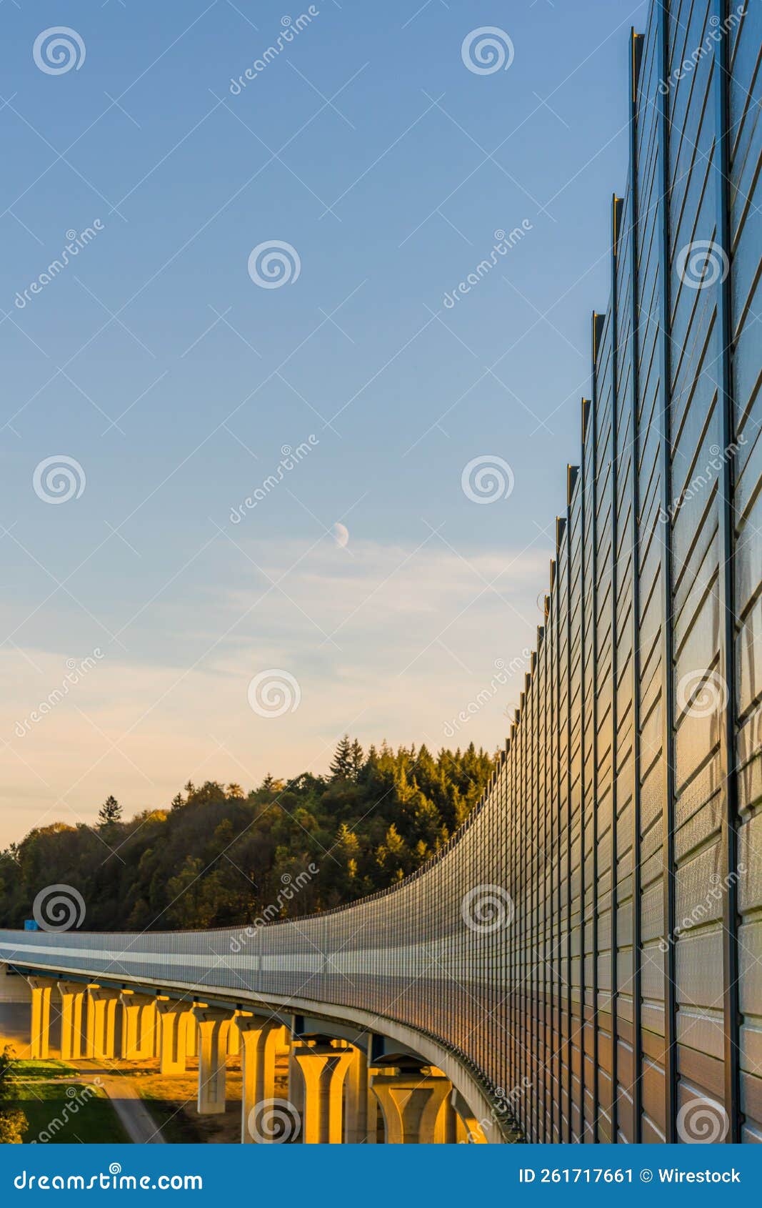 Noise Barrier on A45 Bridge Illuminated by Sun Rays, Surrounded by ...