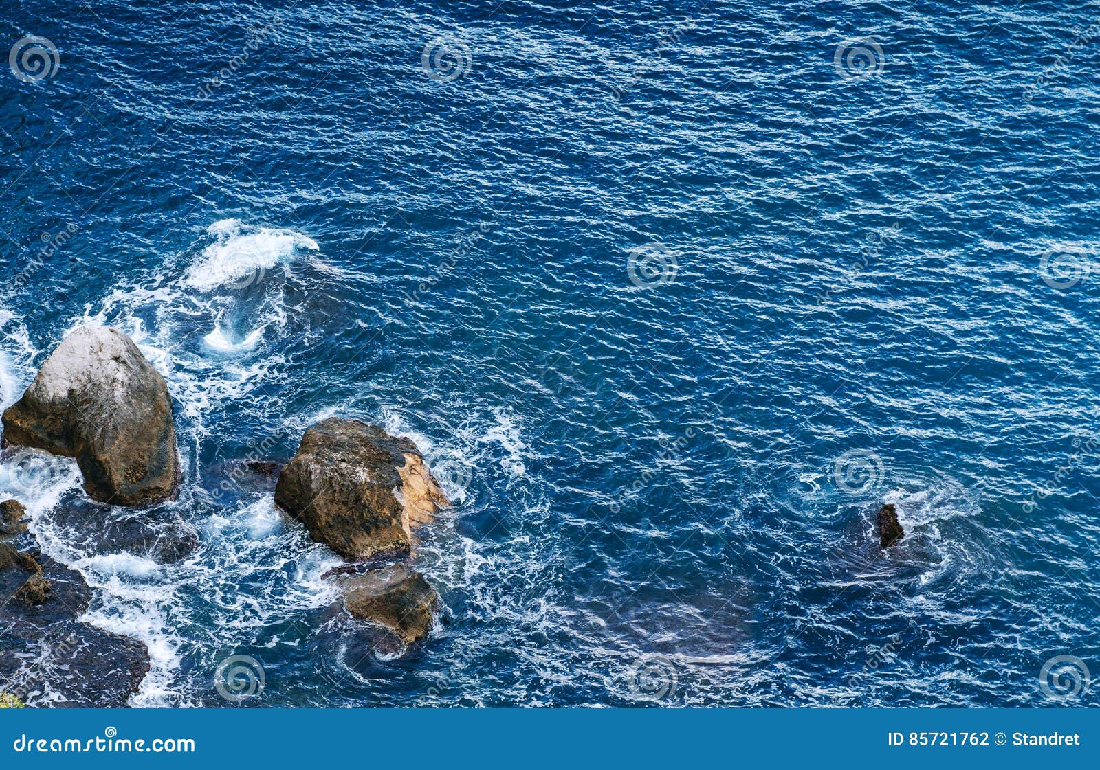 Noisy sea with stones stock photo. Image of foam, rock - 85721762