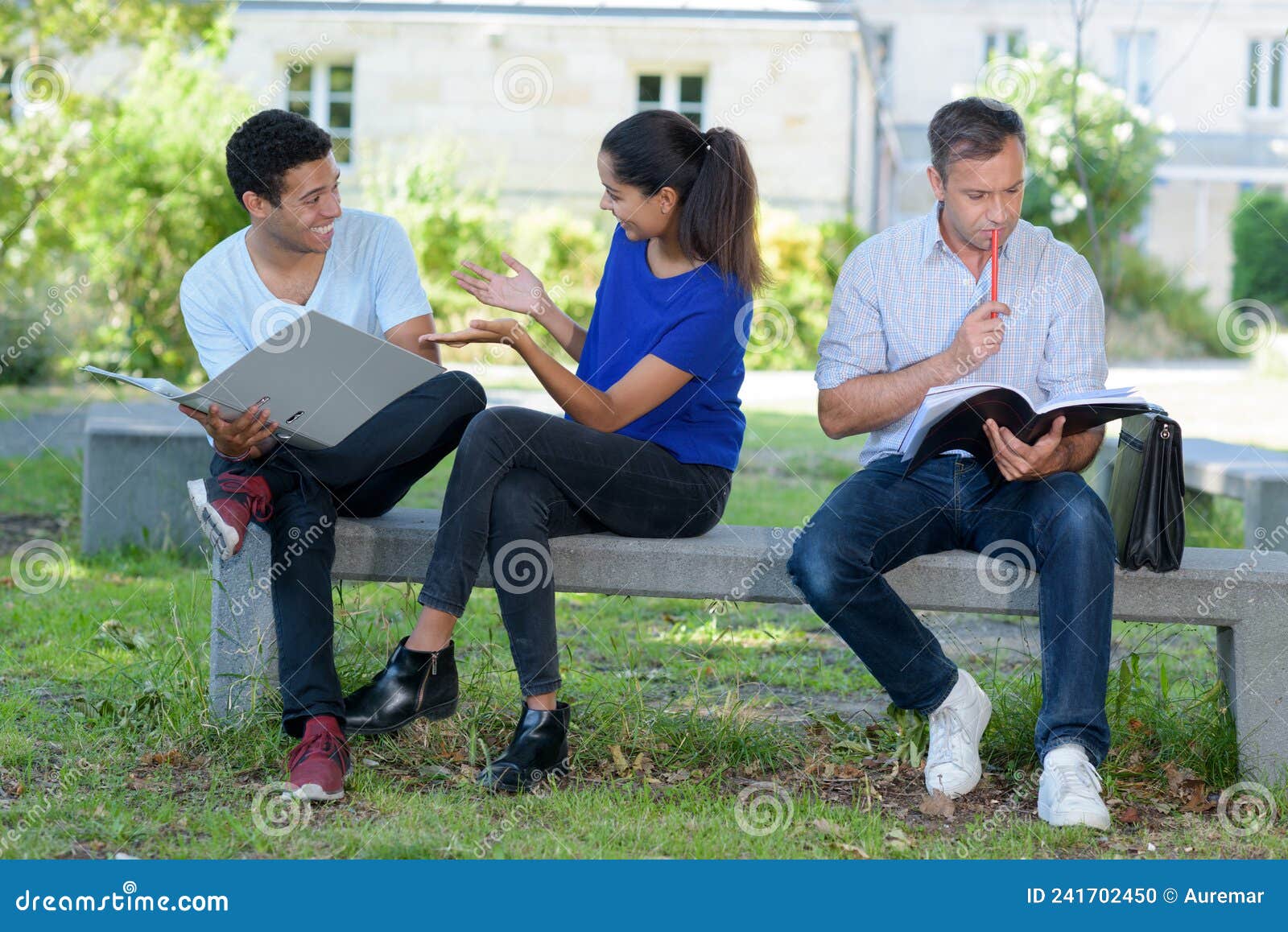 Noisy Students Sitting on Bench Stock Photo - Image of ground, front ...