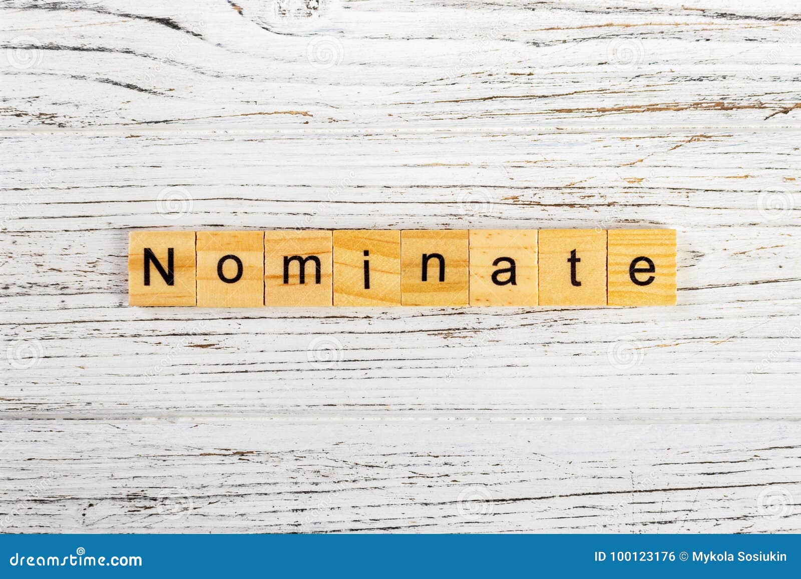 Nominate Symbol. Businessman Turns A Wooden Cube And Change Words ...