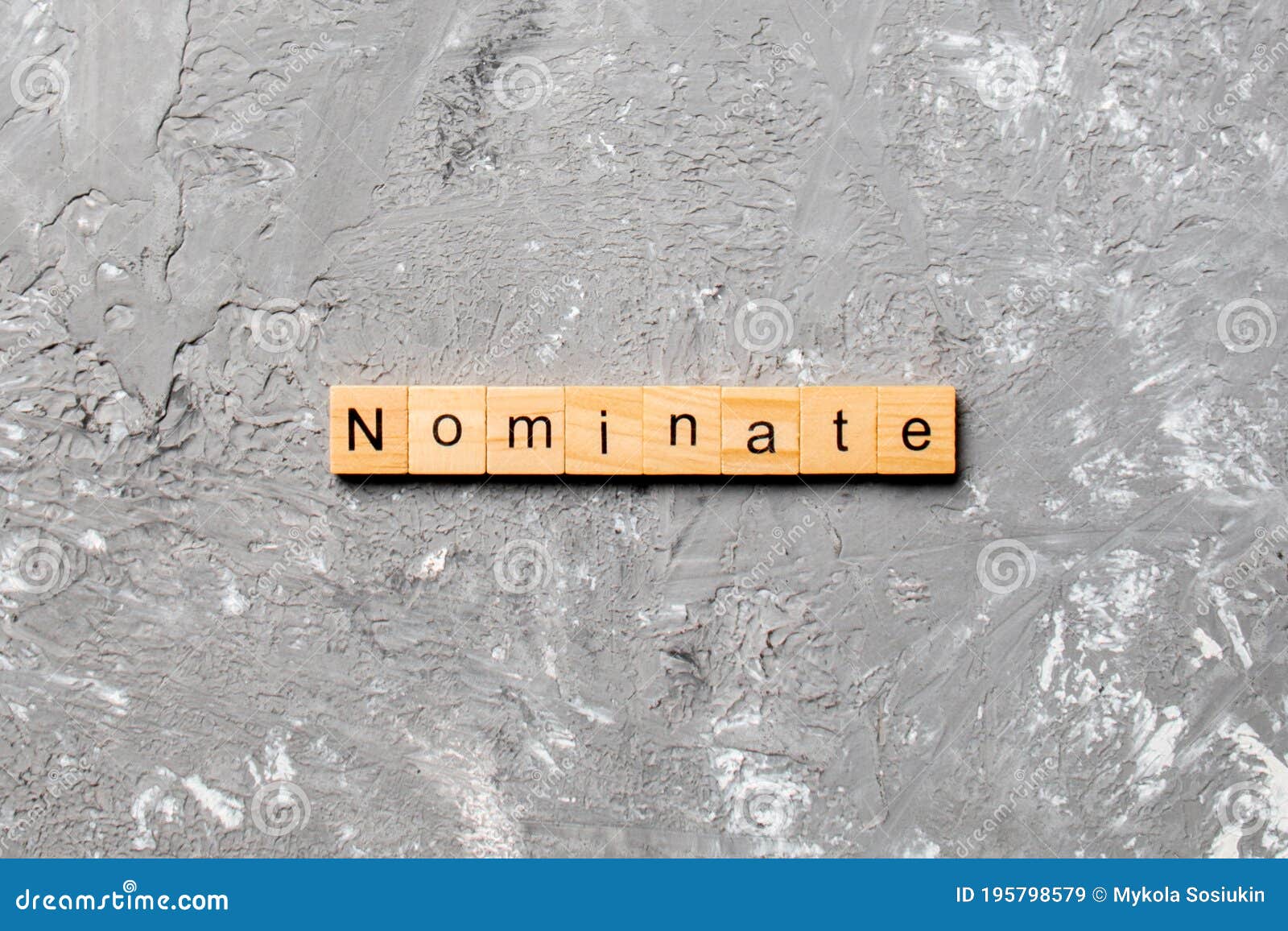Nominate Symbol. Businessman Turns A Wooden Cube And Change Words ...