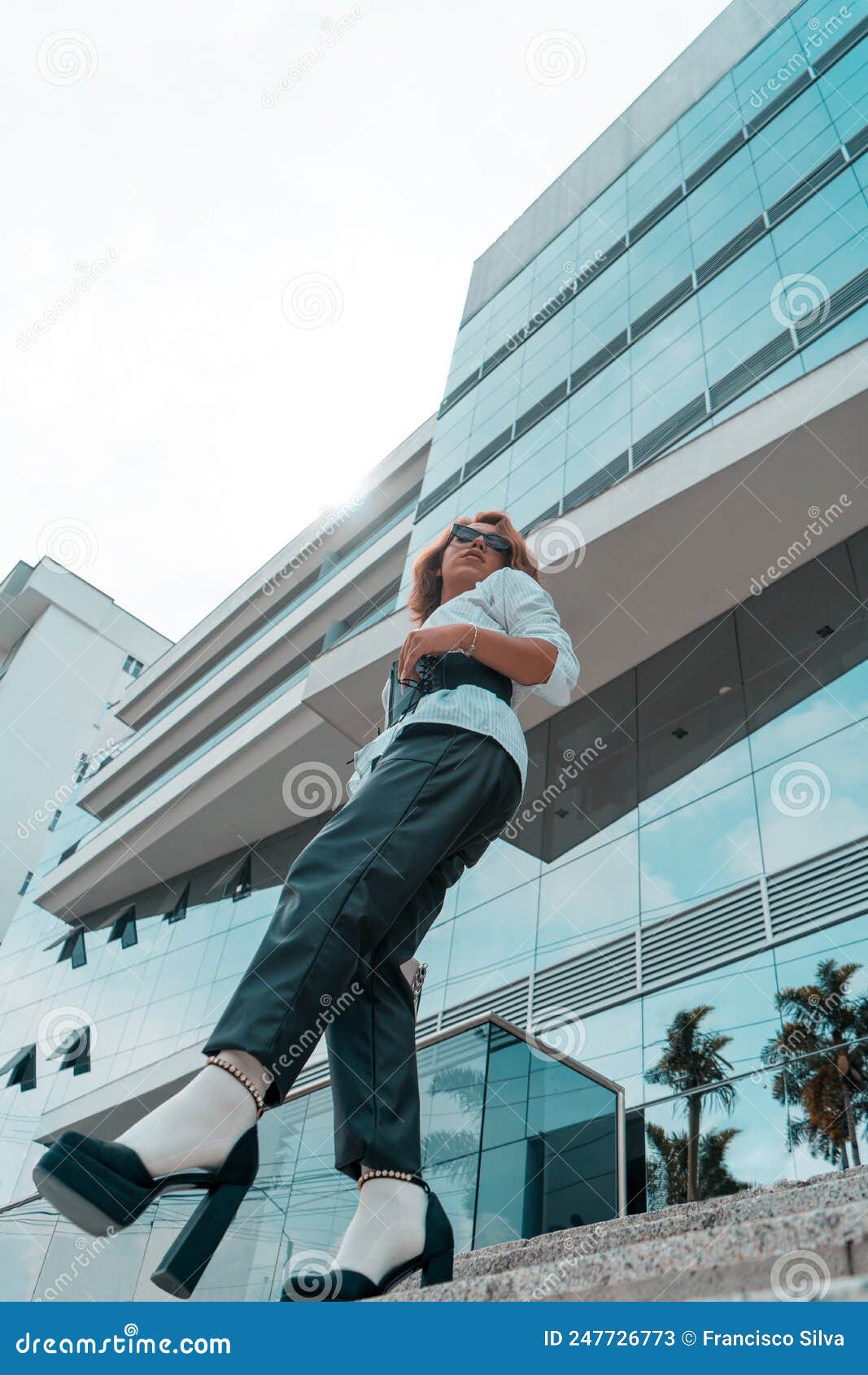 Non-binary Executive Young of LGBTQ Community Walking on Stairs Front ...