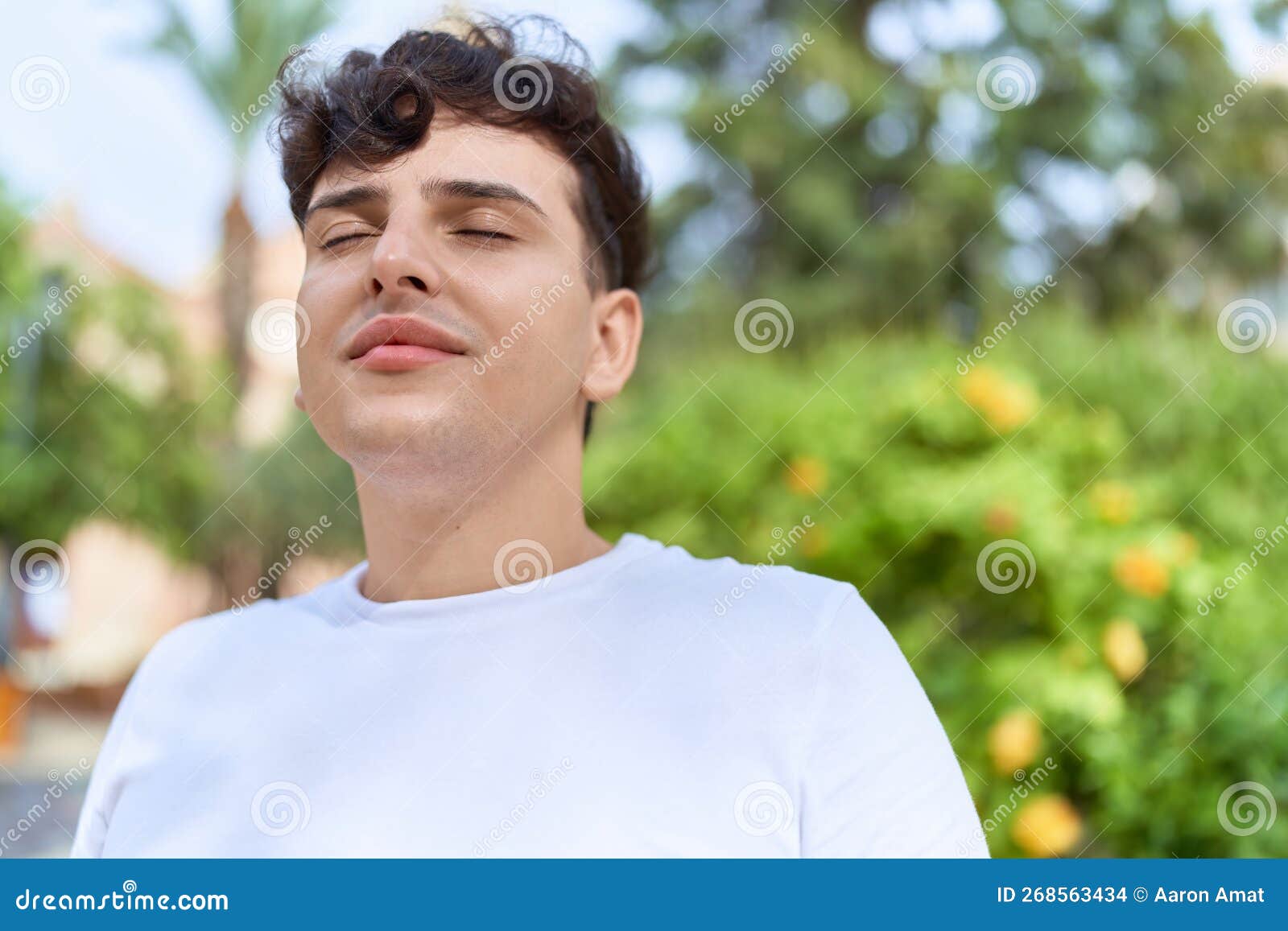 Non Binary Man Breathing with Closed Eyes at Park Stock Photo - Image ...