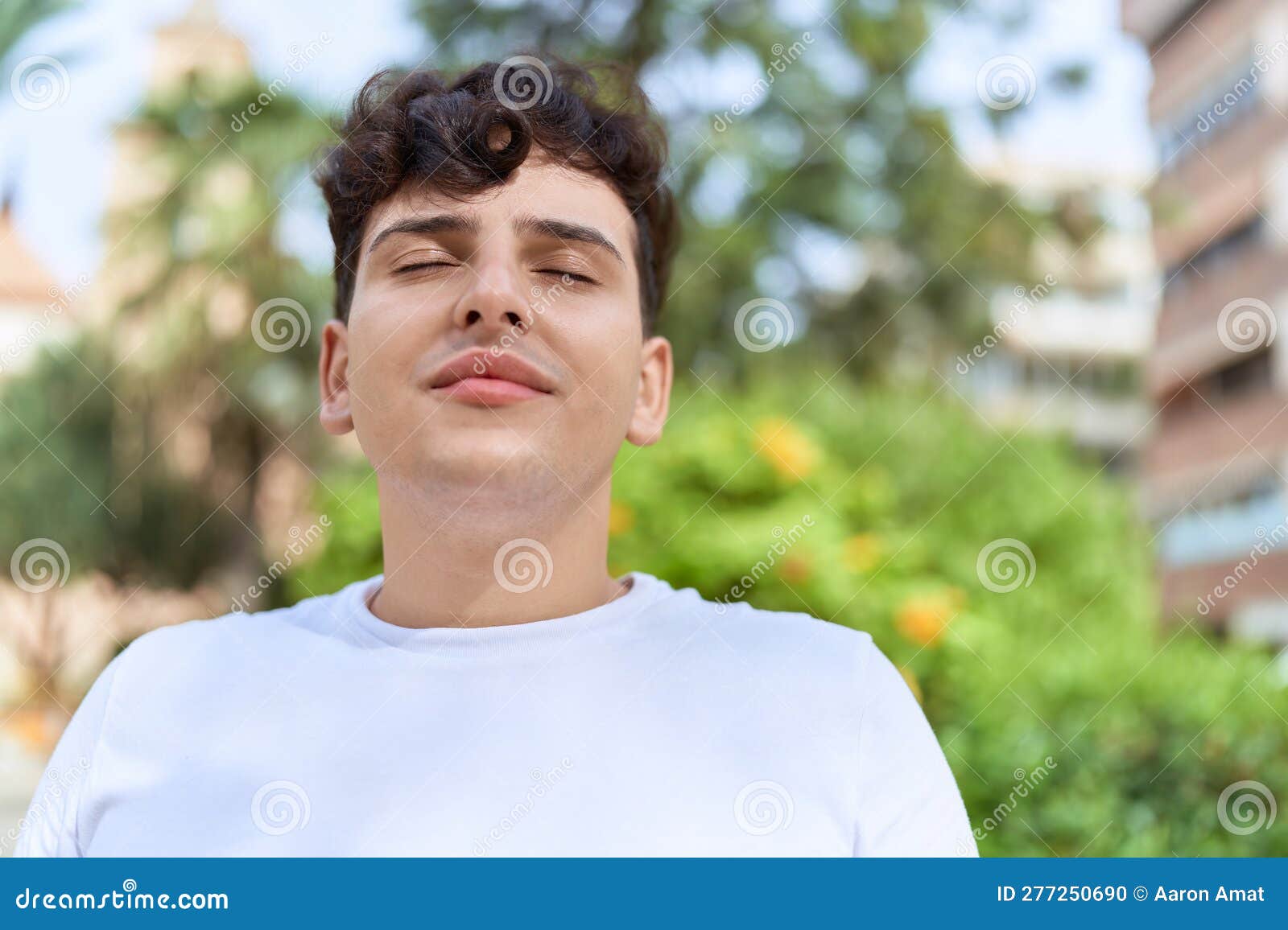 Non Binary Man Breathing with Closed Eyes at Park Stock Photo - Image ...