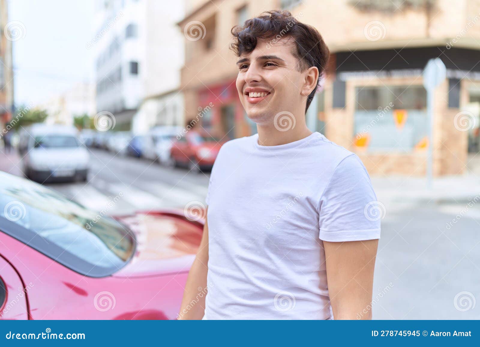 Non Binary Man Smiling Confident Looking To the Side at Street Stock ...