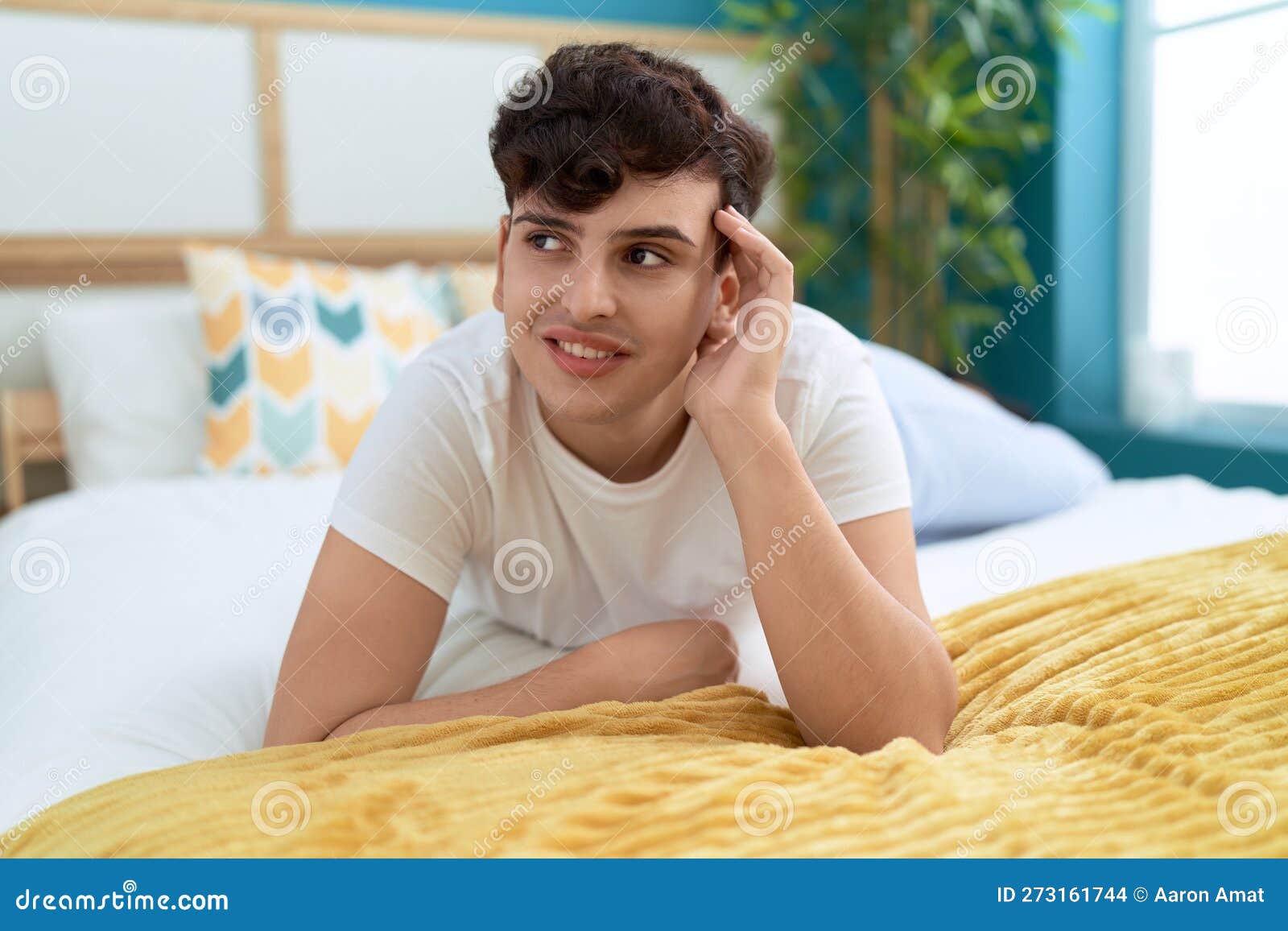 Non Binary Man Smiling Confident Lying on Bed at Bedroom Stock Photo - Image of relaxing ...