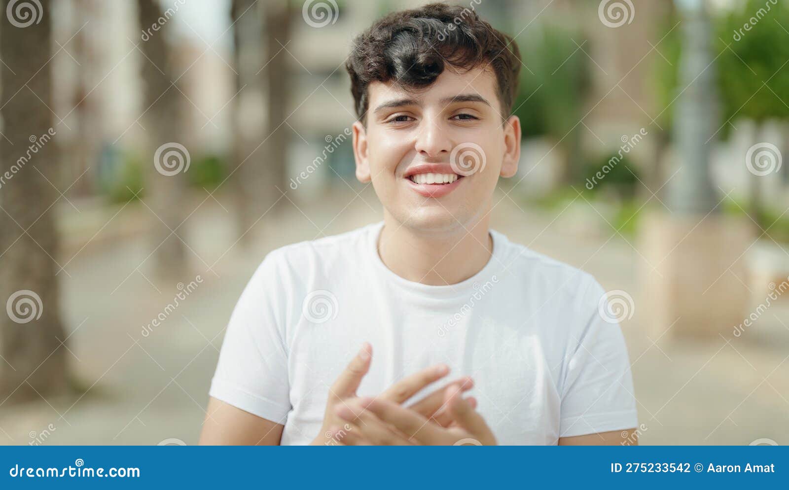 Non Binary Man Smiling Confident Speaking at Park Stock Photo - Image ...