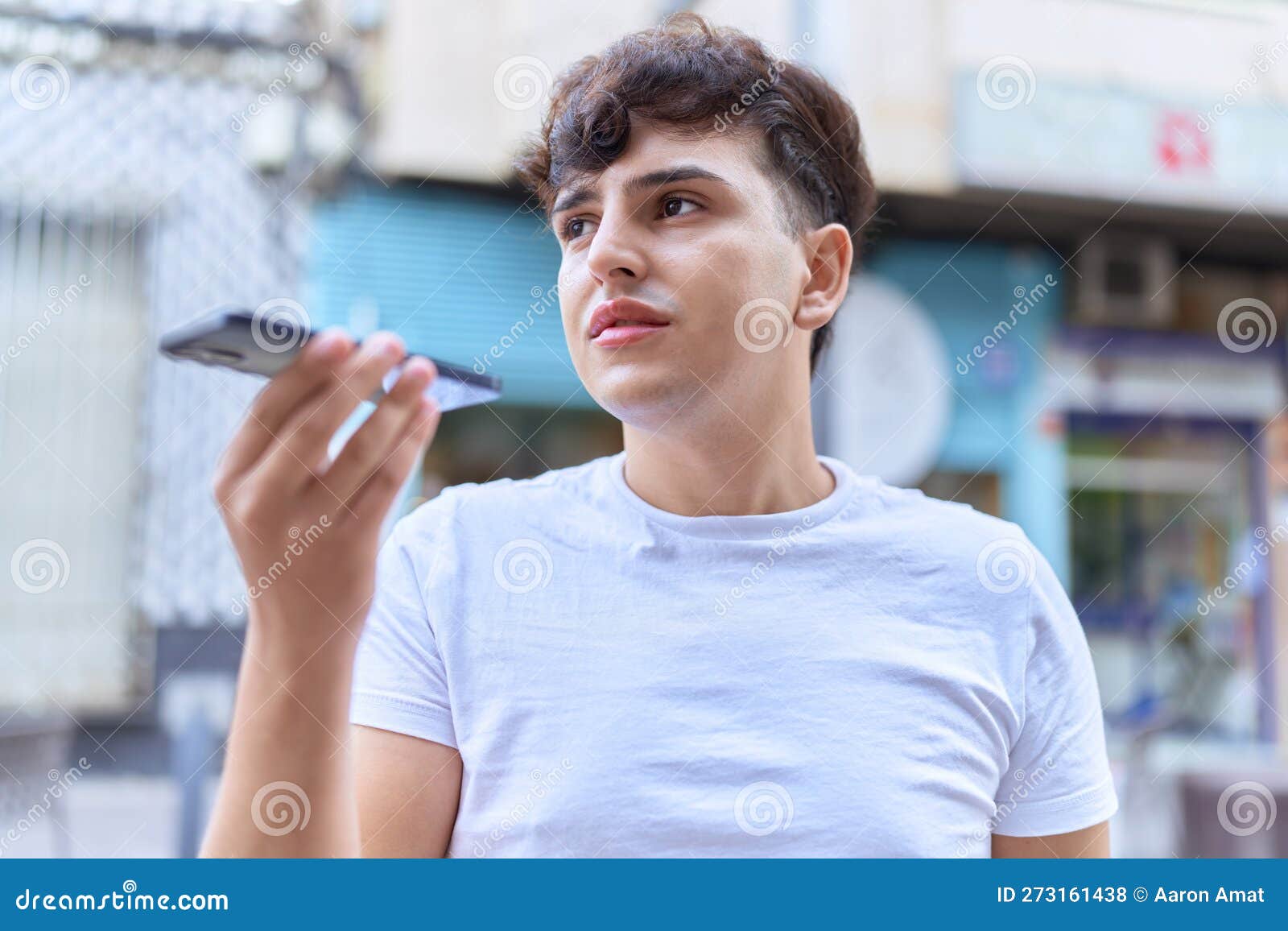 Non Binary Man Smiling Confident Using Smartphone at Street Stock Photo ...