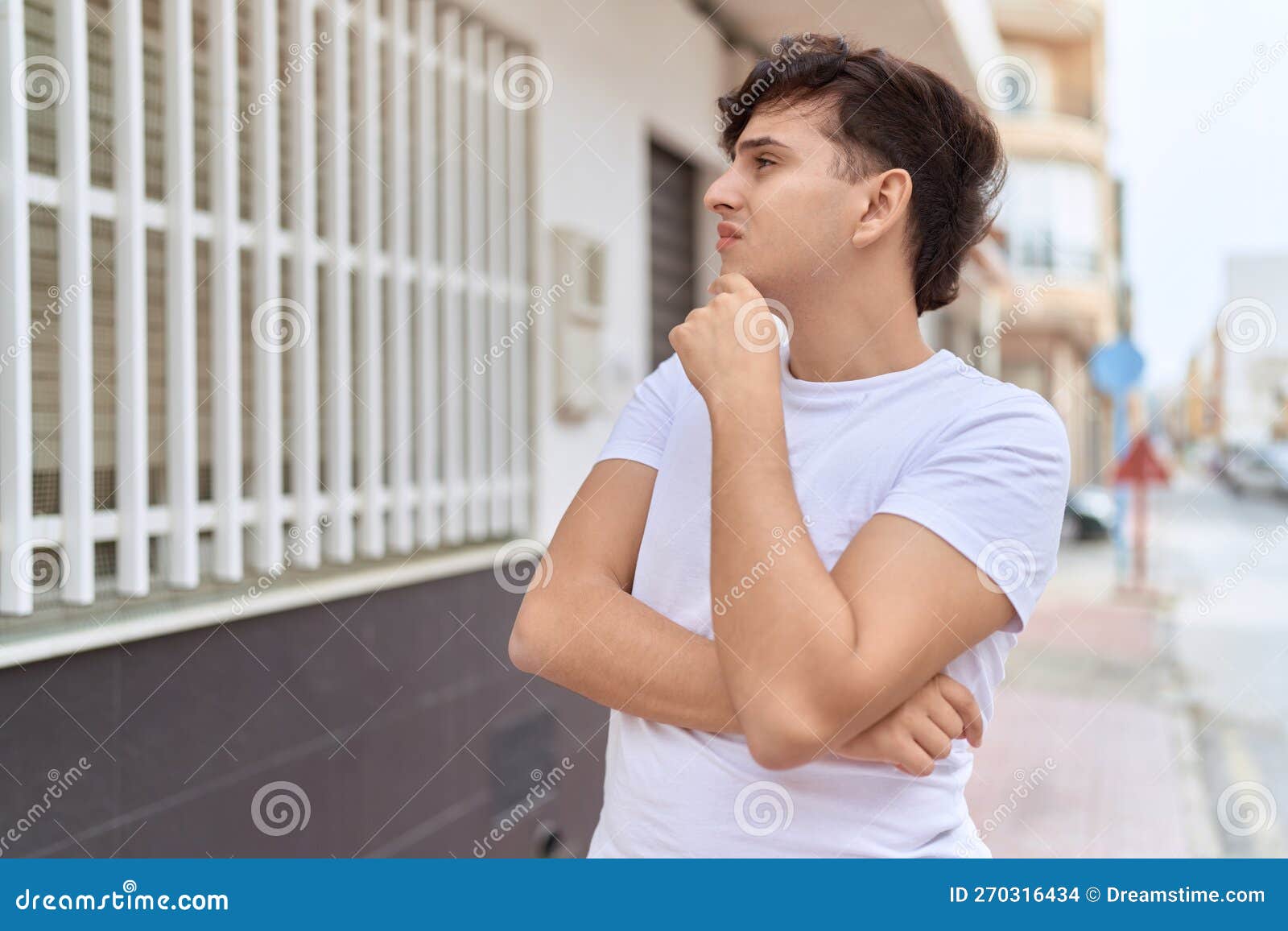 Non Binary Man Standing with Doubt Expression at Street Stock Photo ...