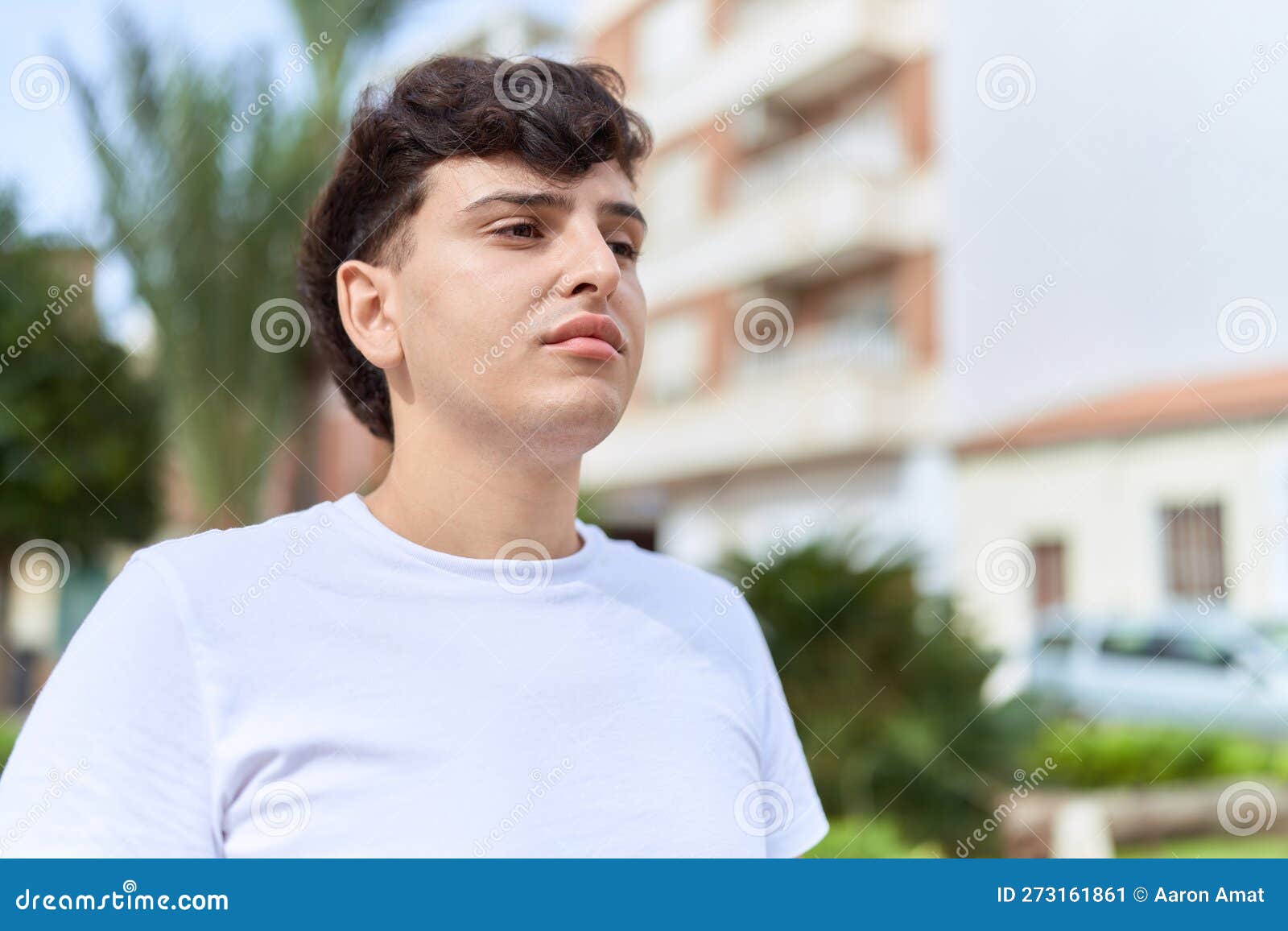 Non Binary Man Standing with Serious Expression at Park Stock Image ...