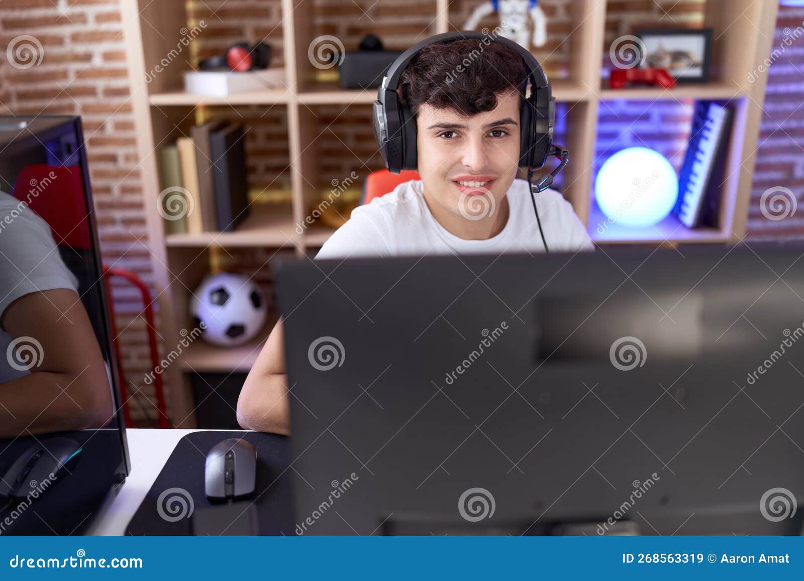 Non Binary Man Streamer Playing Video Game Using Computer at Gaming ...