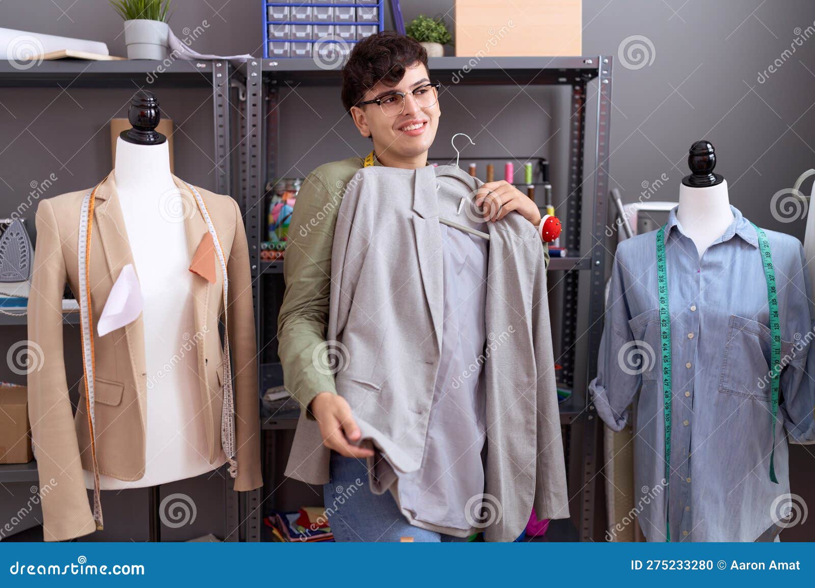 Non Binary Man Tailor Smiling Confident Holding Jacket at Atelier Stock ...