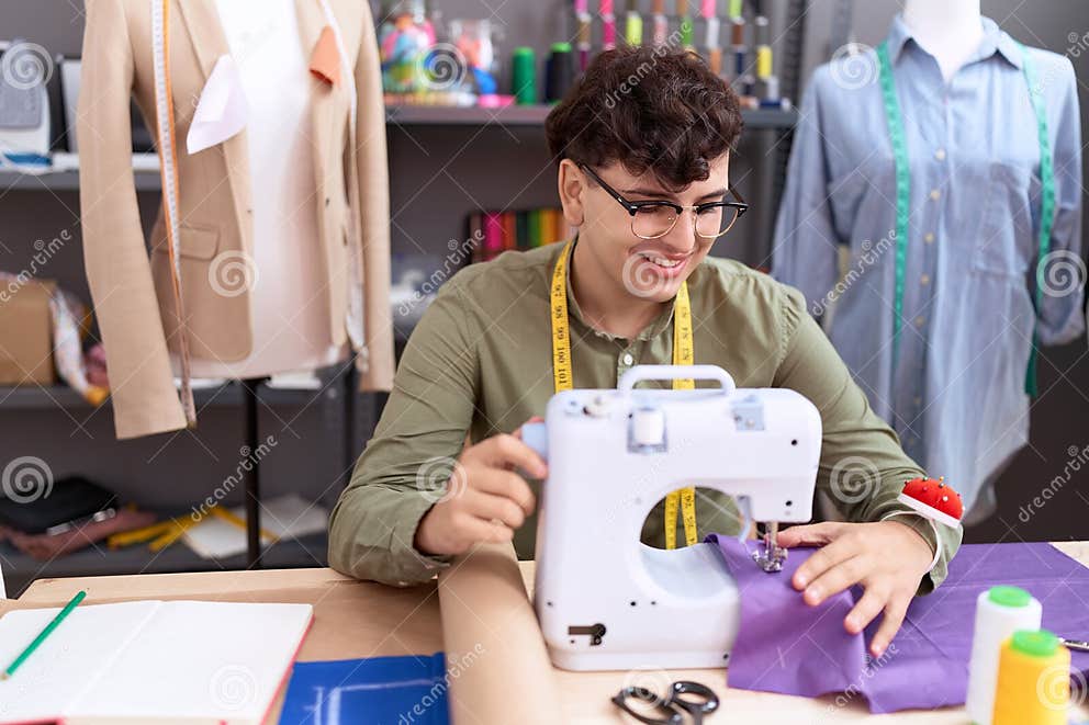 Non Binary Man Tailor Smiling Confident Using Sewing Machine at Atelier ...