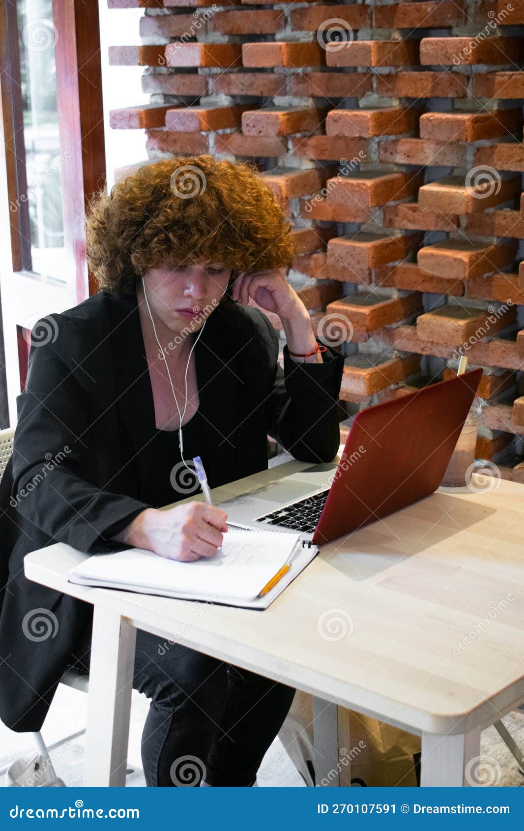 Non-binary Person Makes Some Notes while is Working Stock Image - Image ...