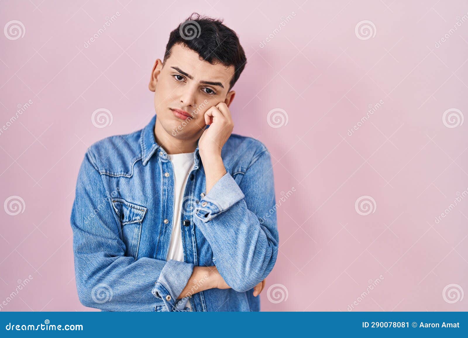 Non Binary Person Standing Over Pink Background Thinking Looking Tired ...